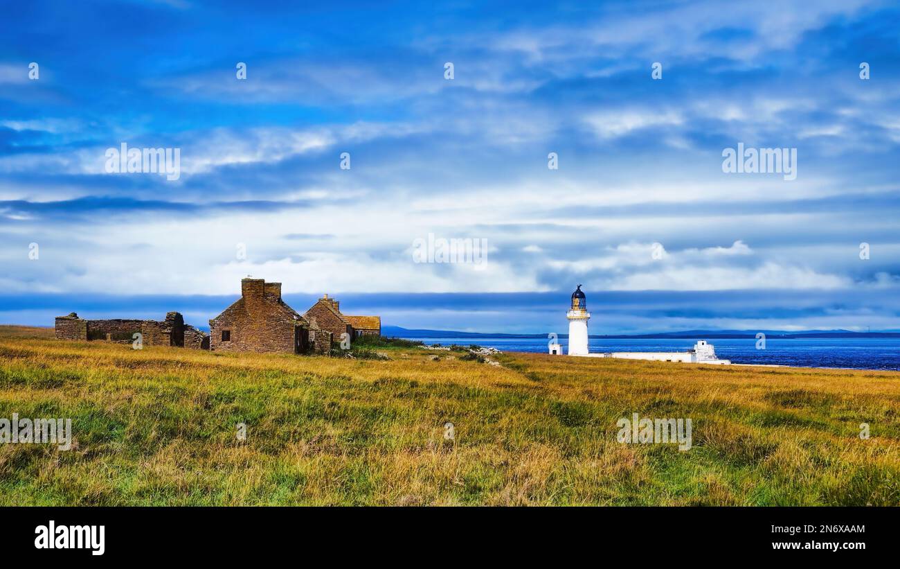 Stroma Lighthouse, abandoned houses, and the Pentland Firth Stock Photo ...