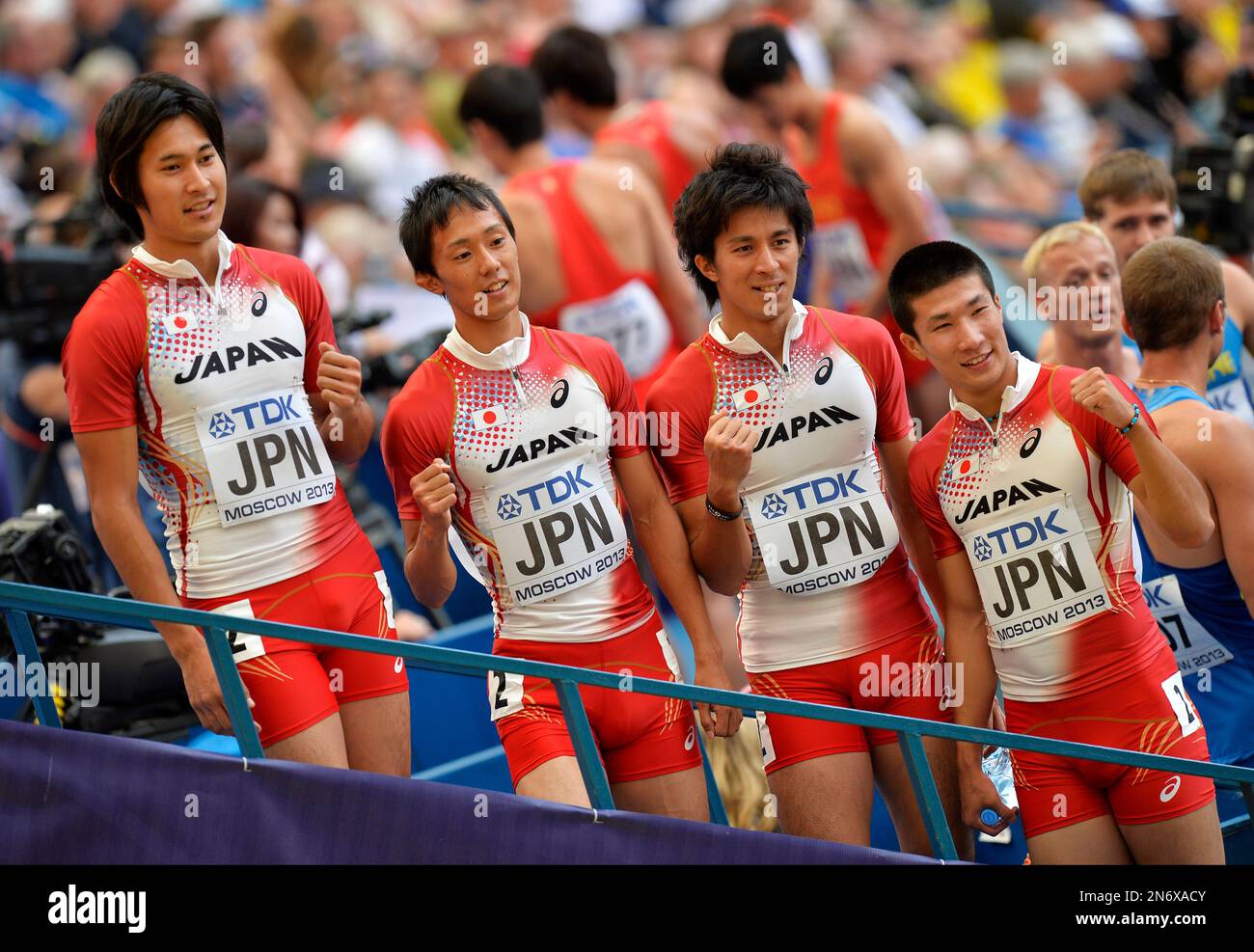 The Japanese team pose for a photo after a men's 4x100-meter relay heat ...