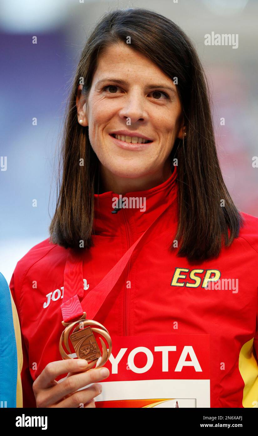 Spain's Ruth Beitia poses on the podium with her bronze medal for the ...