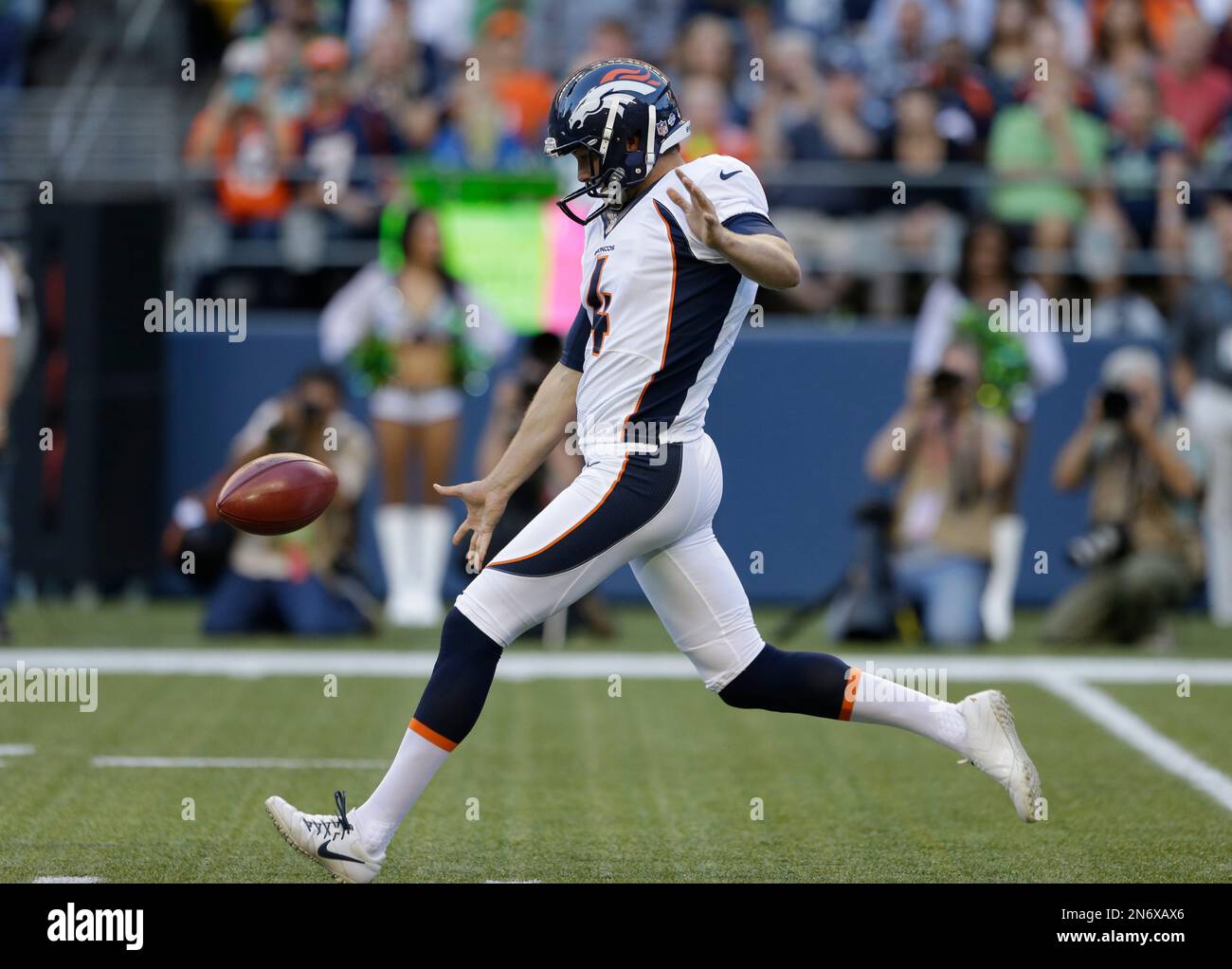 Denver Broncos kicker Britton Colquitt kicks against the Seattle ...