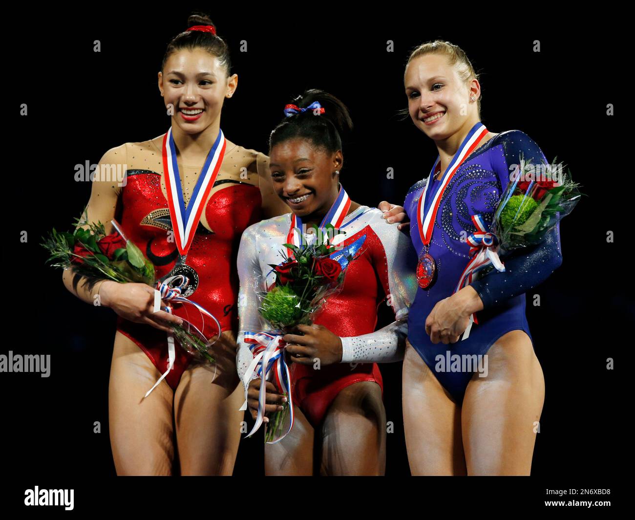 Simone Biles, center, reacts during the medals ceremony at the U.S ...