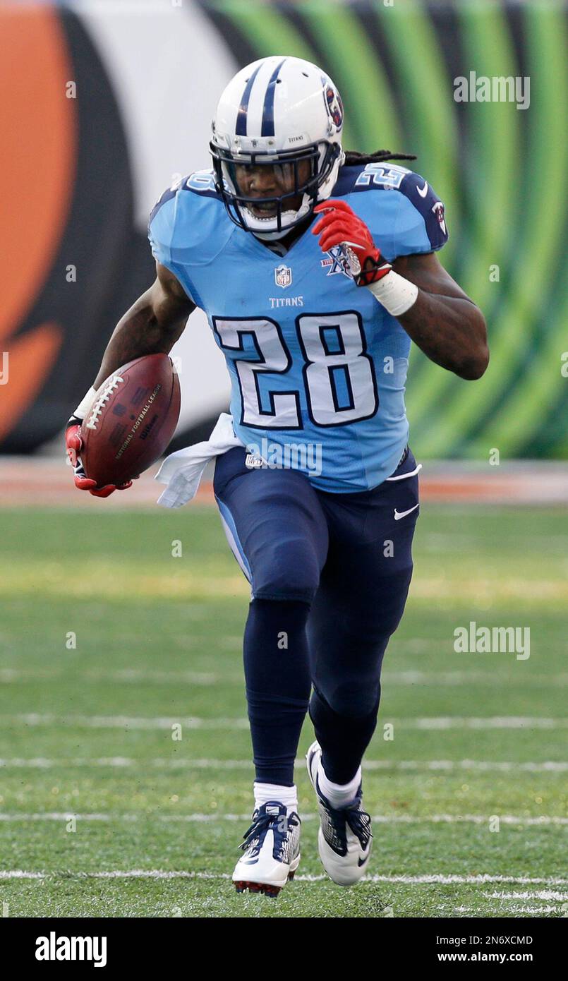 Tennessee Titans running back Chris Johnson runs against the Cincinnati ...