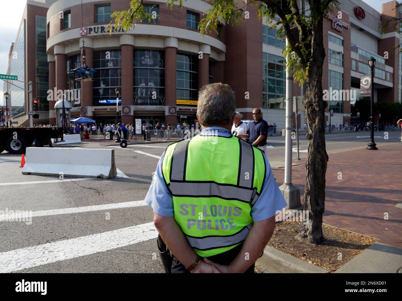 St. Louis police officer Vince Hayden patrols outside the Edward Jones ...