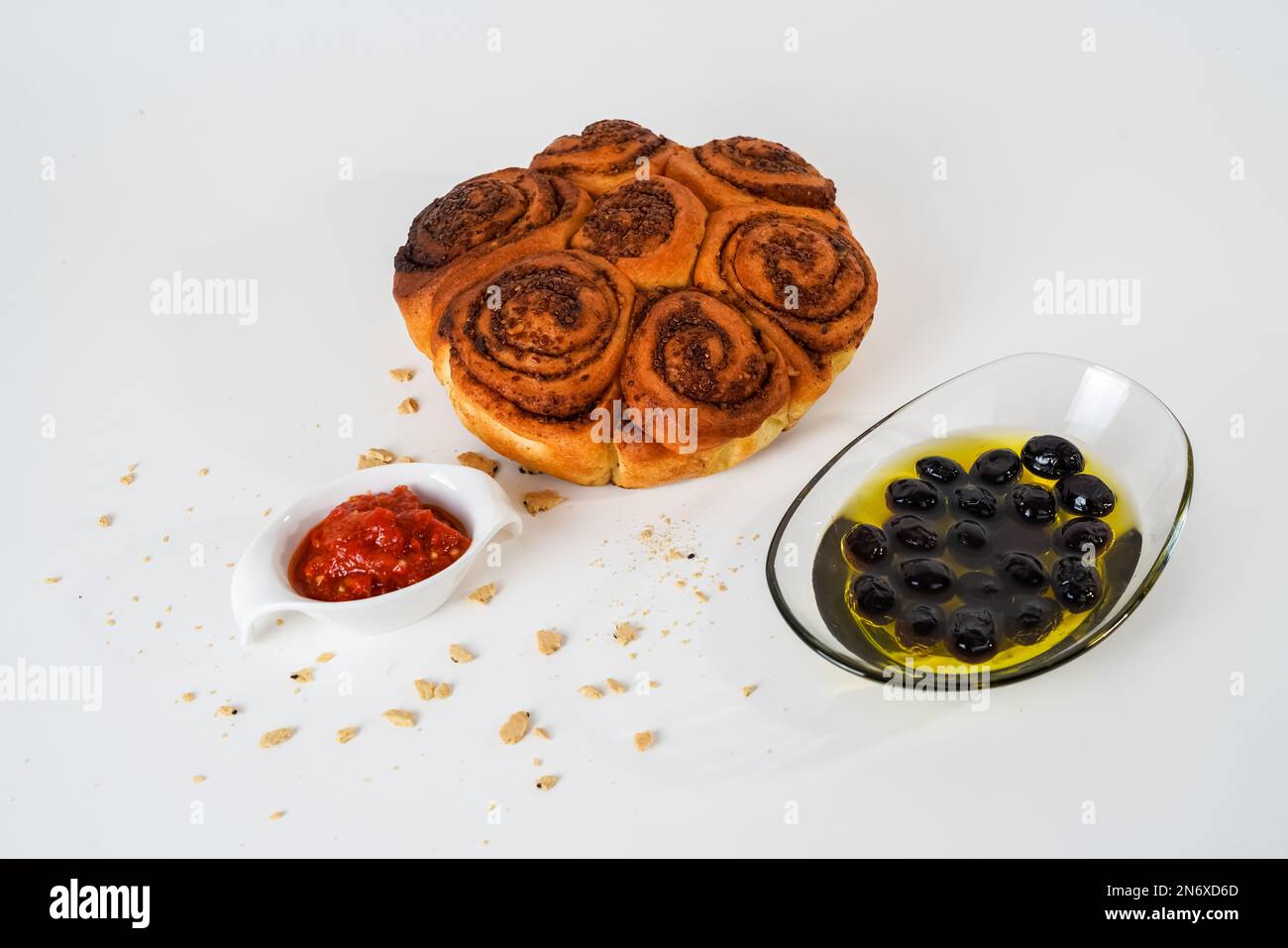 Salty bread with walnut poppy sesame, black olives and chili tomato ...