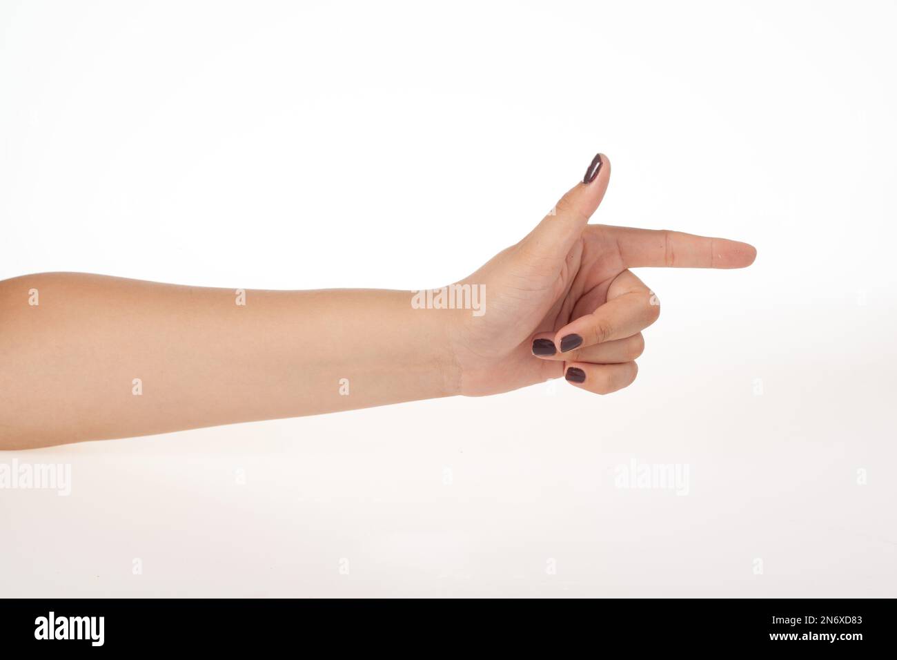 Hand pointing sign isolated on white background Stock Photo - Alamy