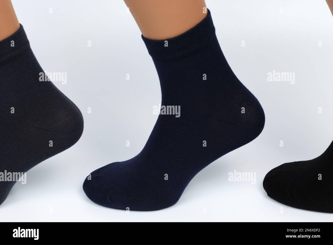 Socks on a white background. Socks on the leg Stock Photo - Alamy