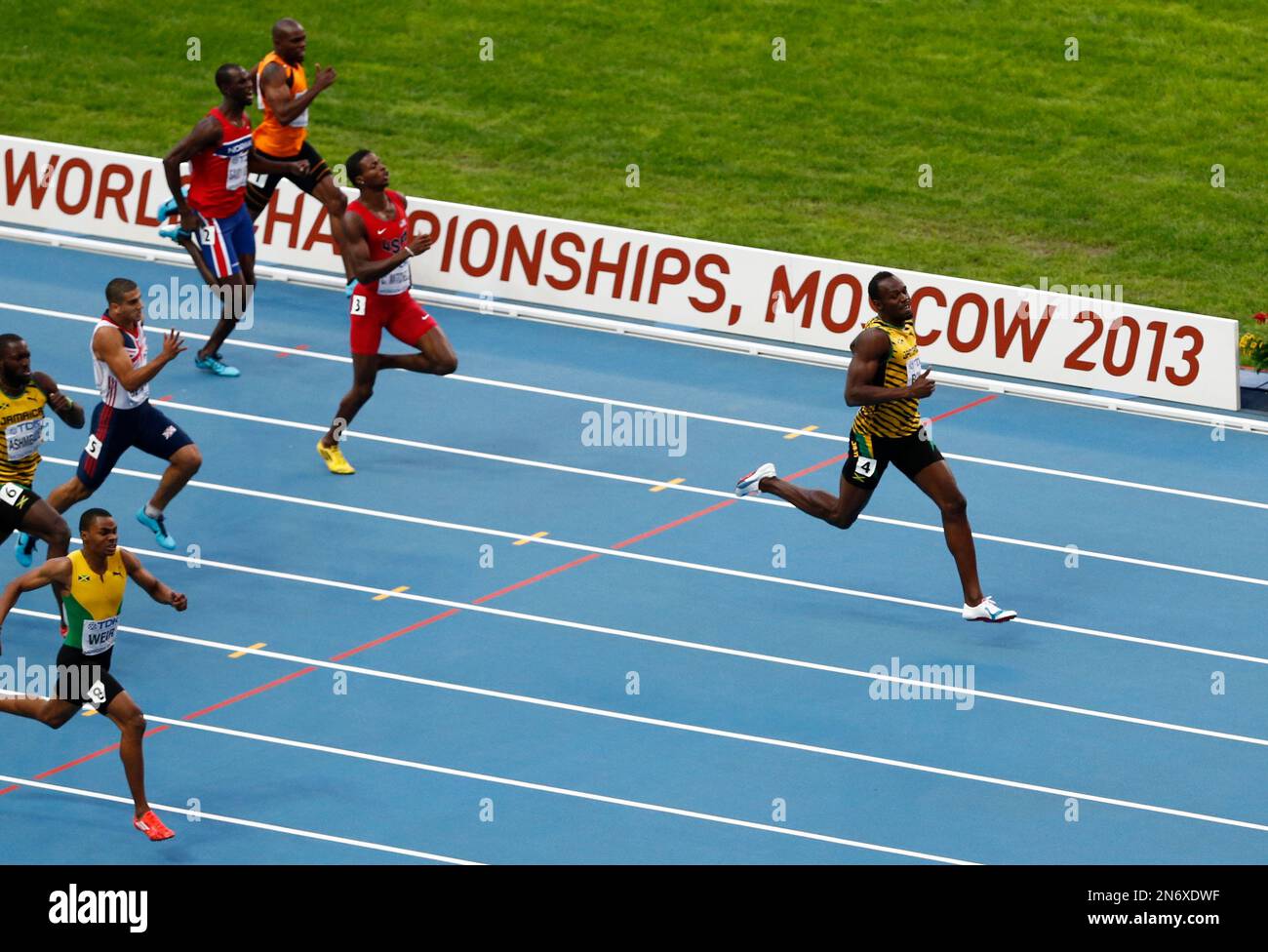 Jamaica's Usain Bolt, right, powers ahead to win the men's 200-meter ...