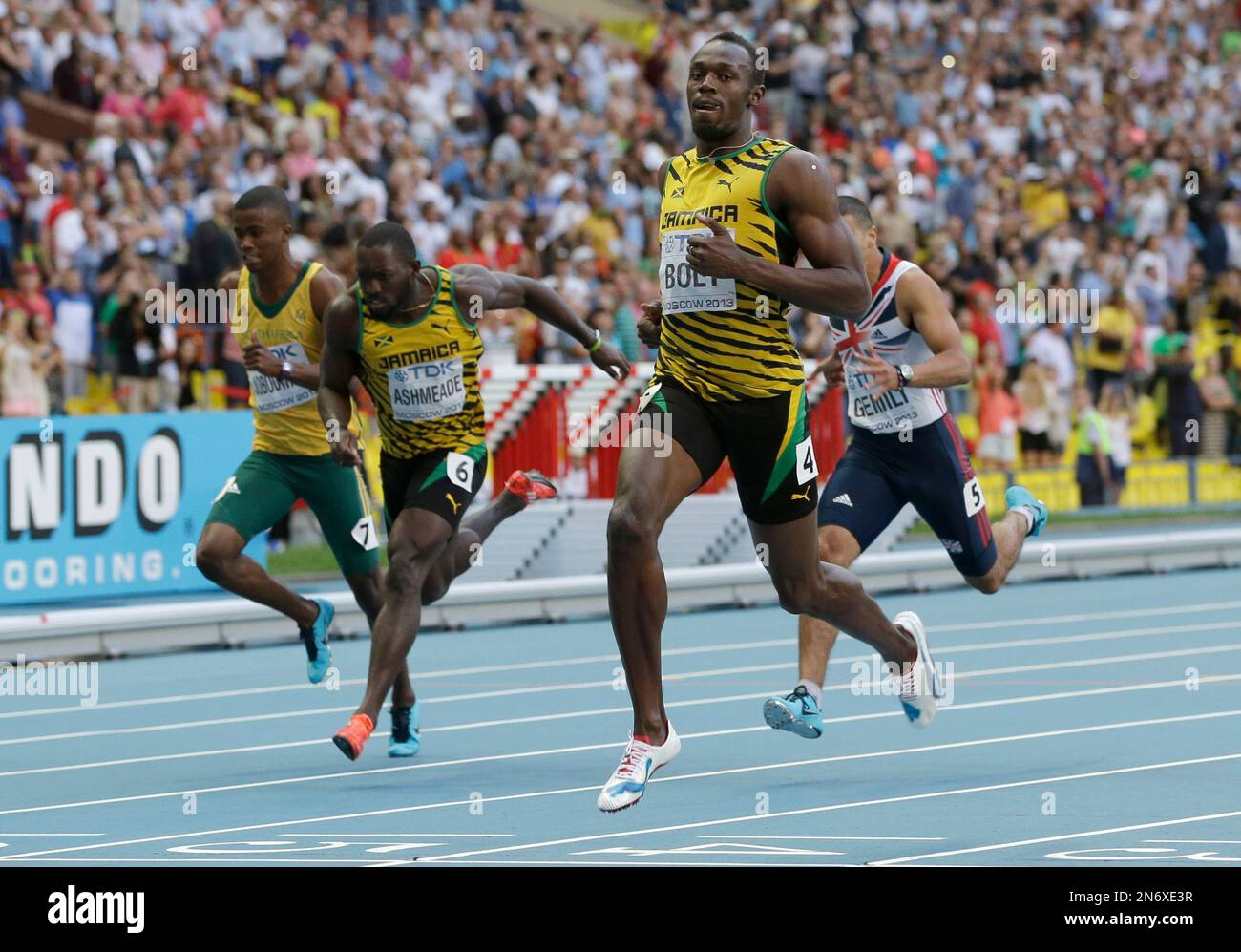Jamaica's Usain Bolt crosses the finish line to win the men's 200-meter ...