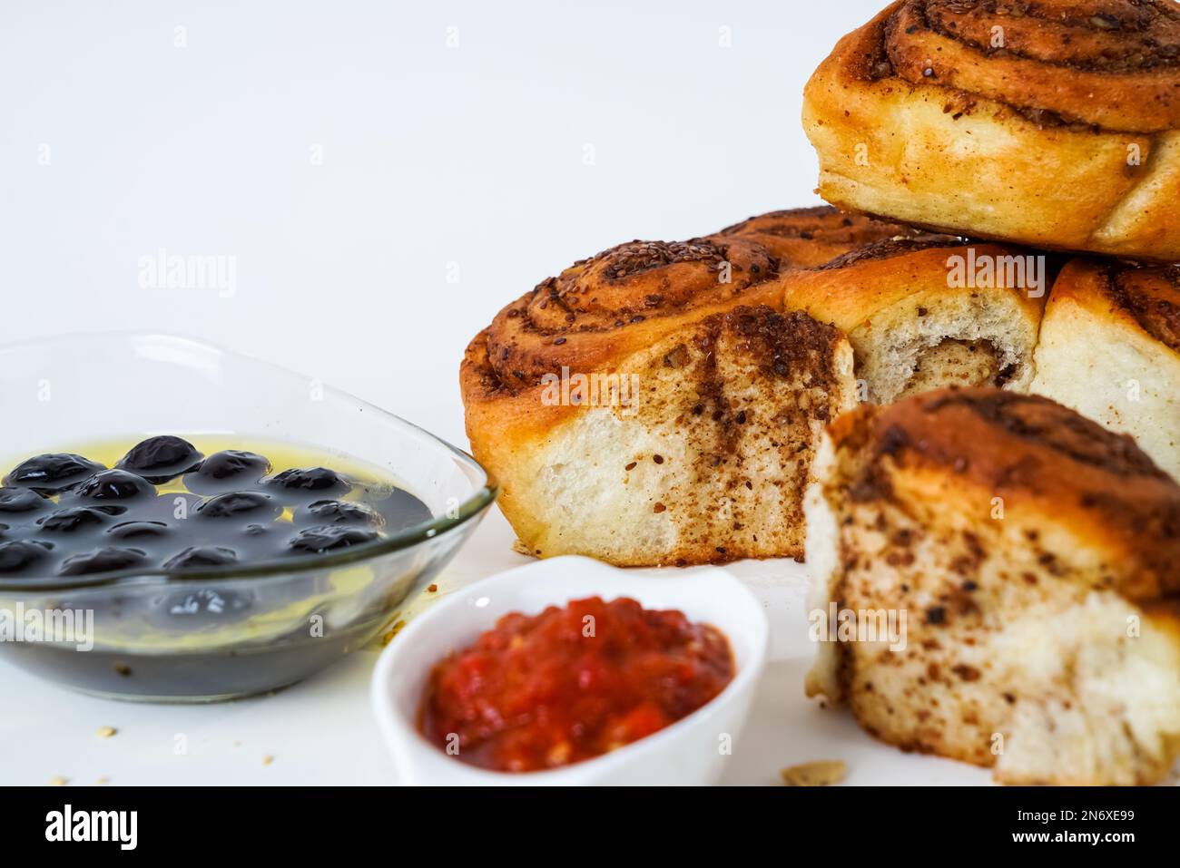 Salty bread with walnut poppy sesame, black olives and chili tomato ...