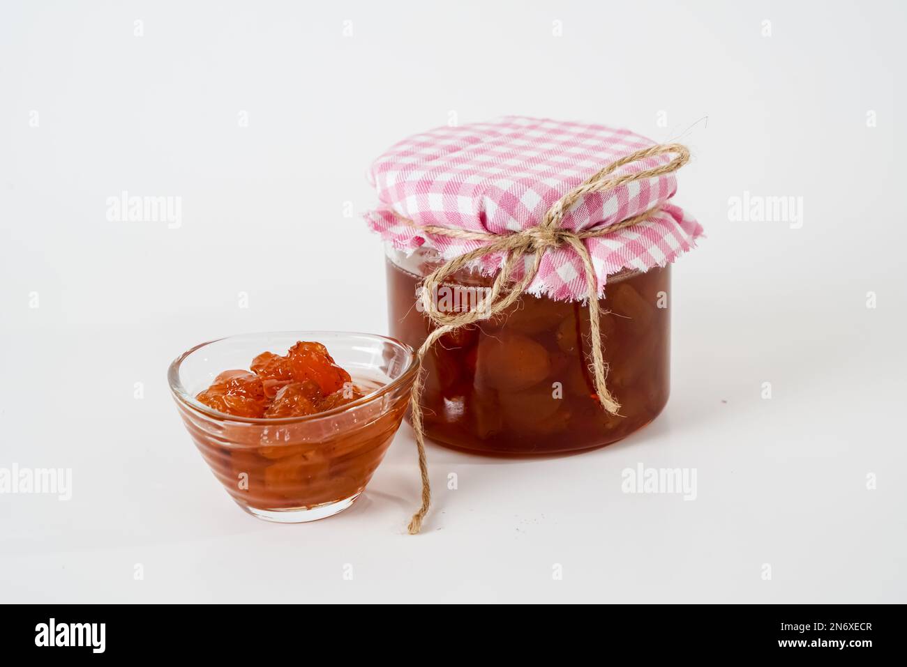 Homemade white grape jam, jar and small bowl with jam isolated on white ...