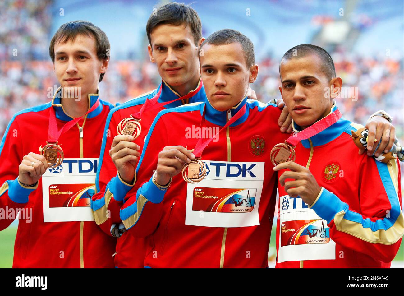 The Russian team pose on the podium with their bronze medals for the ...