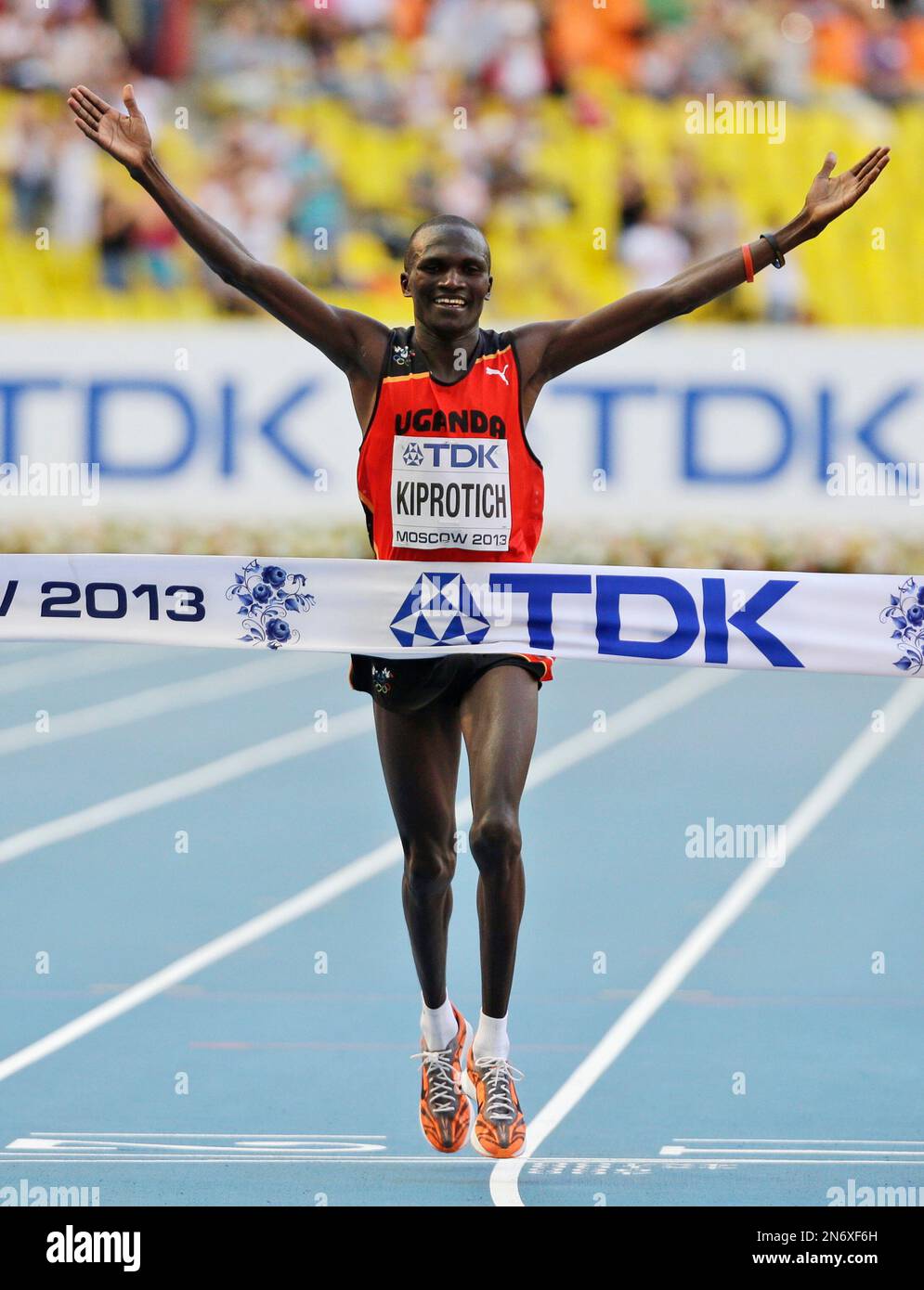 Uganda's Stephen Kiprotich crosses the finish line to win the men's marathon at the World ...