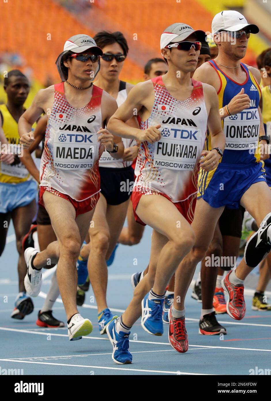 Japan's Kazuhiro Maeda, left, and Japan's Masakazu Fujiwara start the men's marathon at the ...