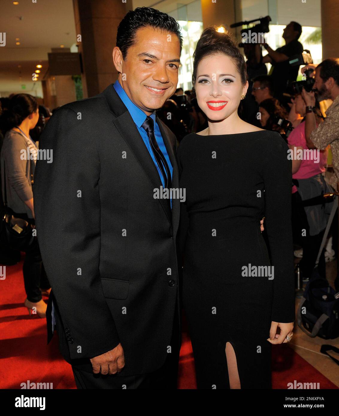Actor Carlos Gomez poses with Casey Garcia at the 28th Annual Imagen ...