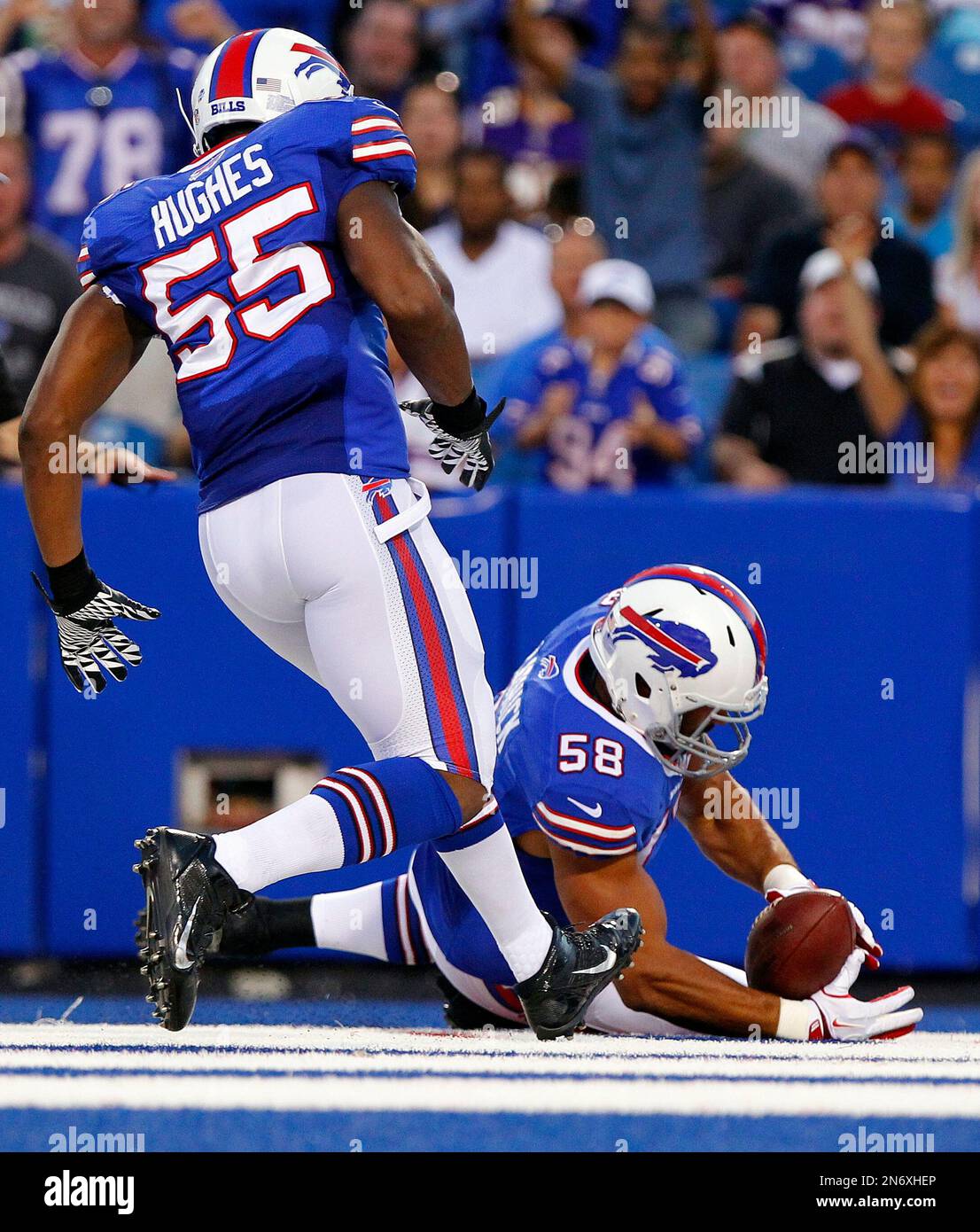 Buffalo Bills' Jamie Blatnick (58) recovers a ball fumbled by Minnesota ...