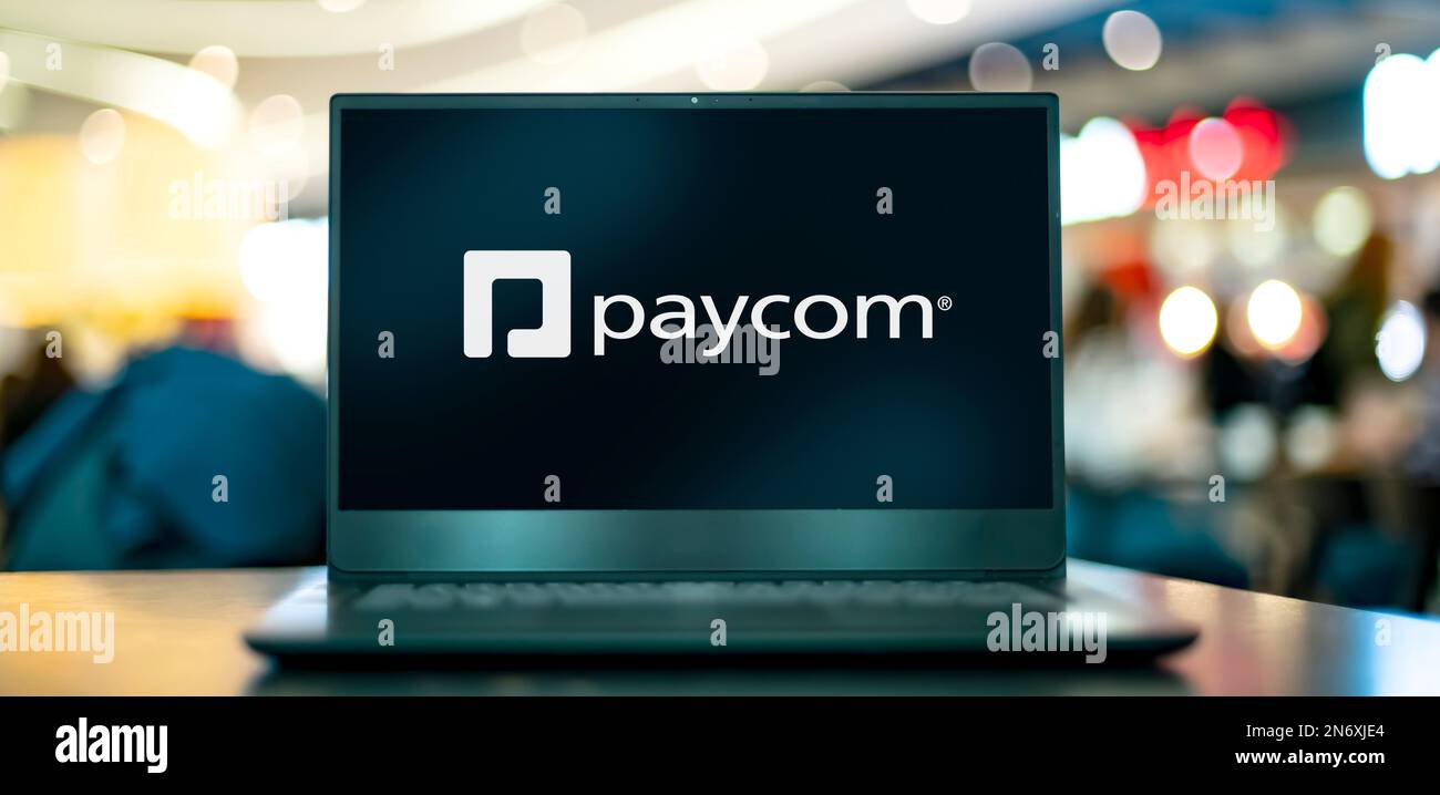 POZNAN, POL - MAY 4, 2022: Laptop computer displaying logo of Paycom ...