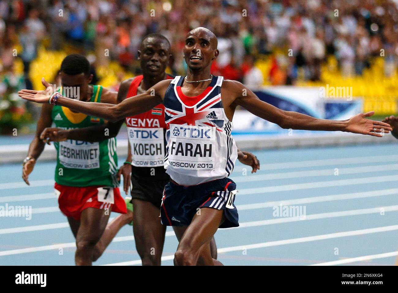 Britain's Mo Farah celebrates winning the gold medal ahead of second ...