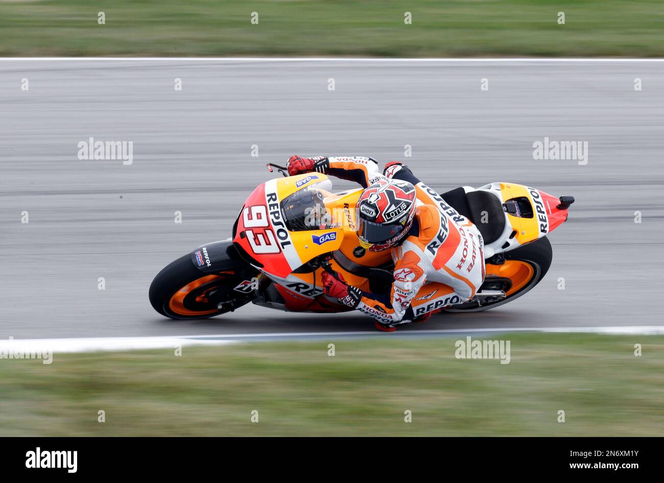 Marc Marquez, of Spain, speeds through a turn during practice for the ...