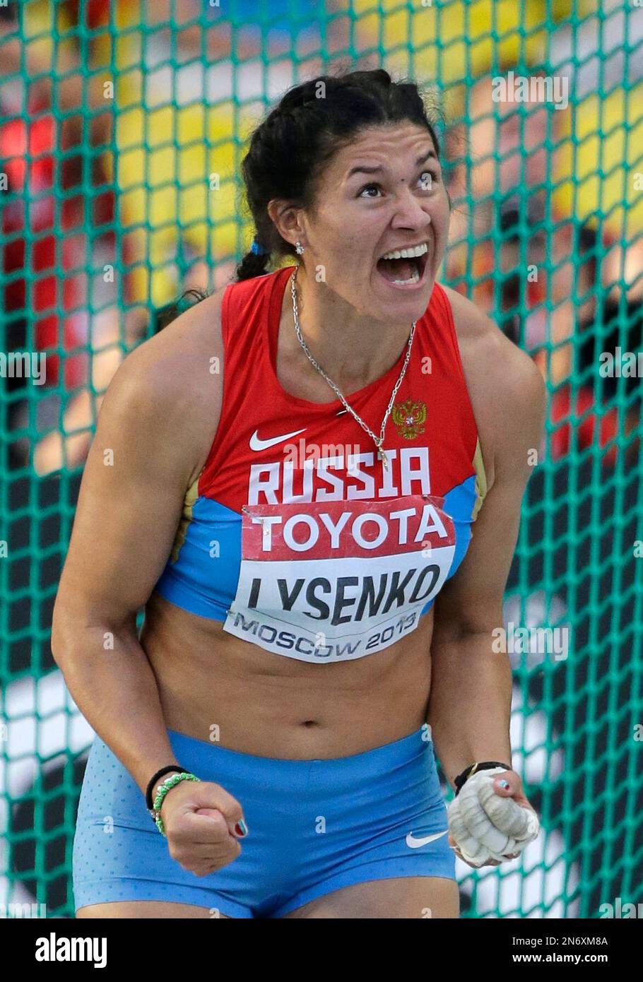 Russia's Tatyana Lysenko celebrates after an attempt in the women's ...