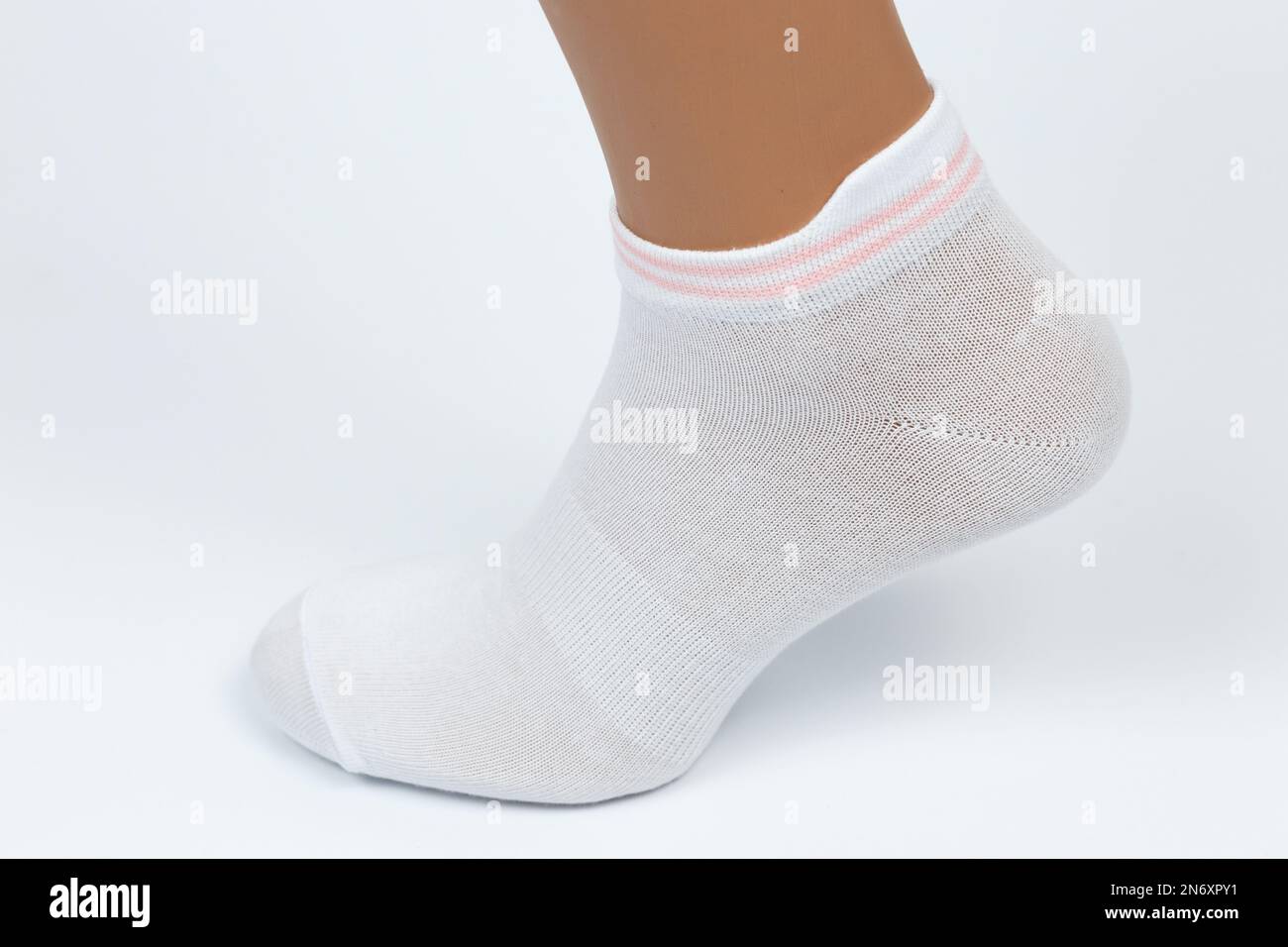 Socks on a white background. Socks on the leg Stock Photo - Alamy