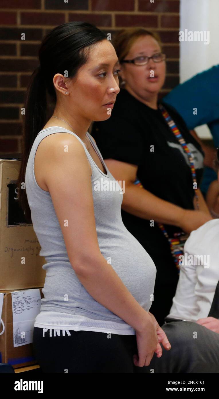 Jennifer Doan listens during a meeting of past and present staff of ...