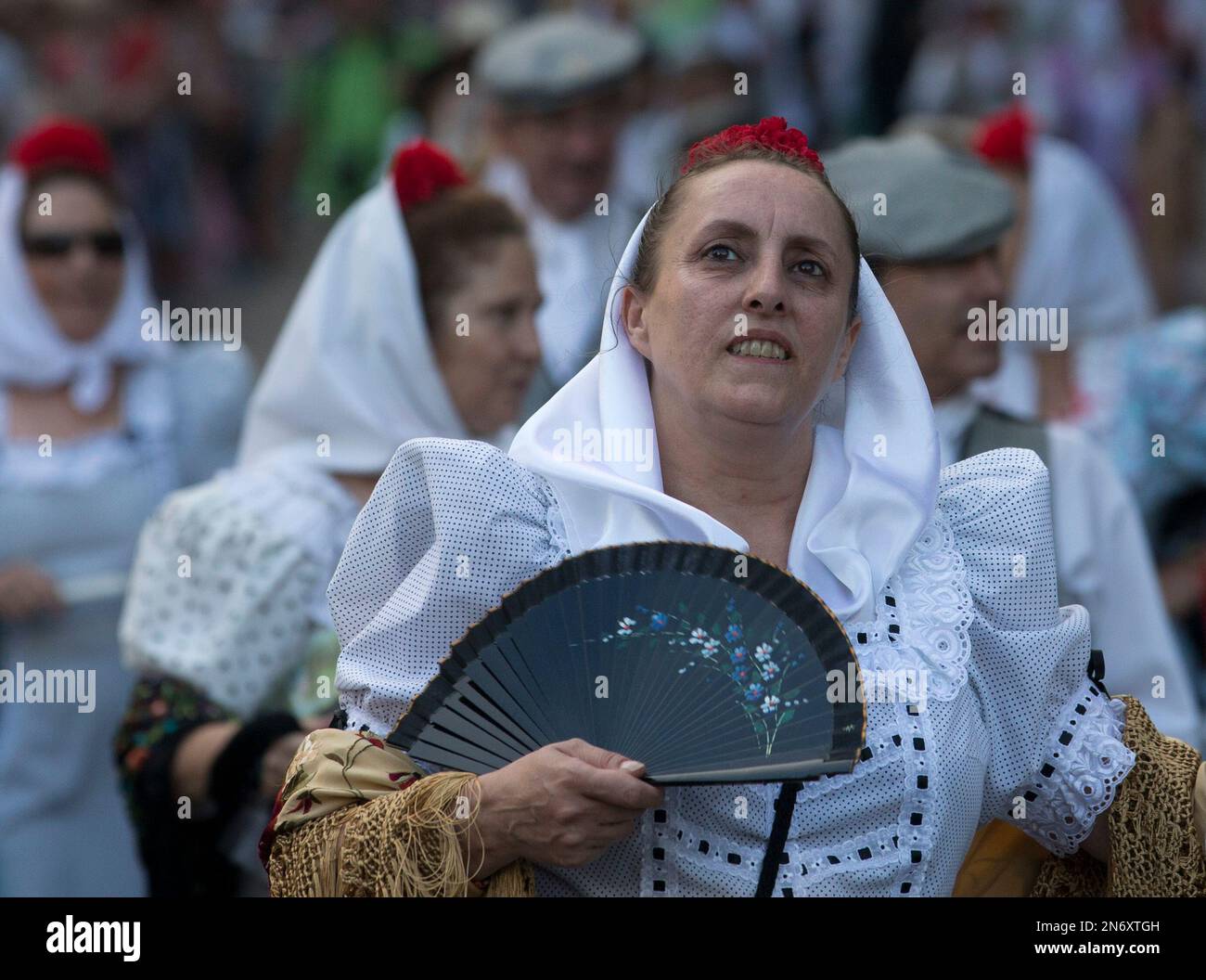 A woman dressed in traditional 'chulapa' attire, typical in Madrid ...