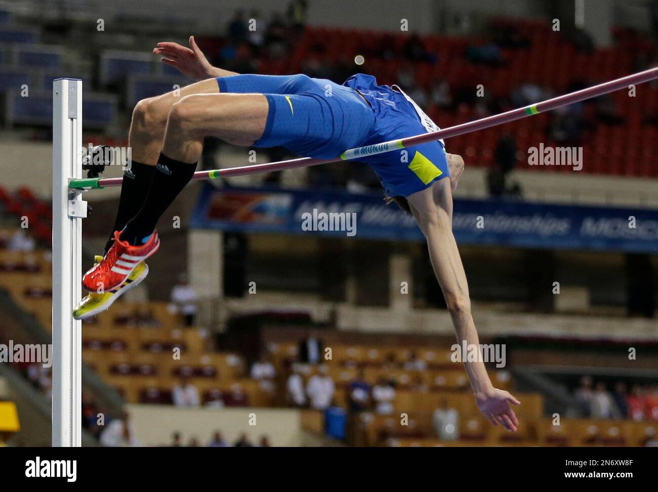 Gold medal winner Bohdan Bondarenko of Ukraine touches the bar as he ...