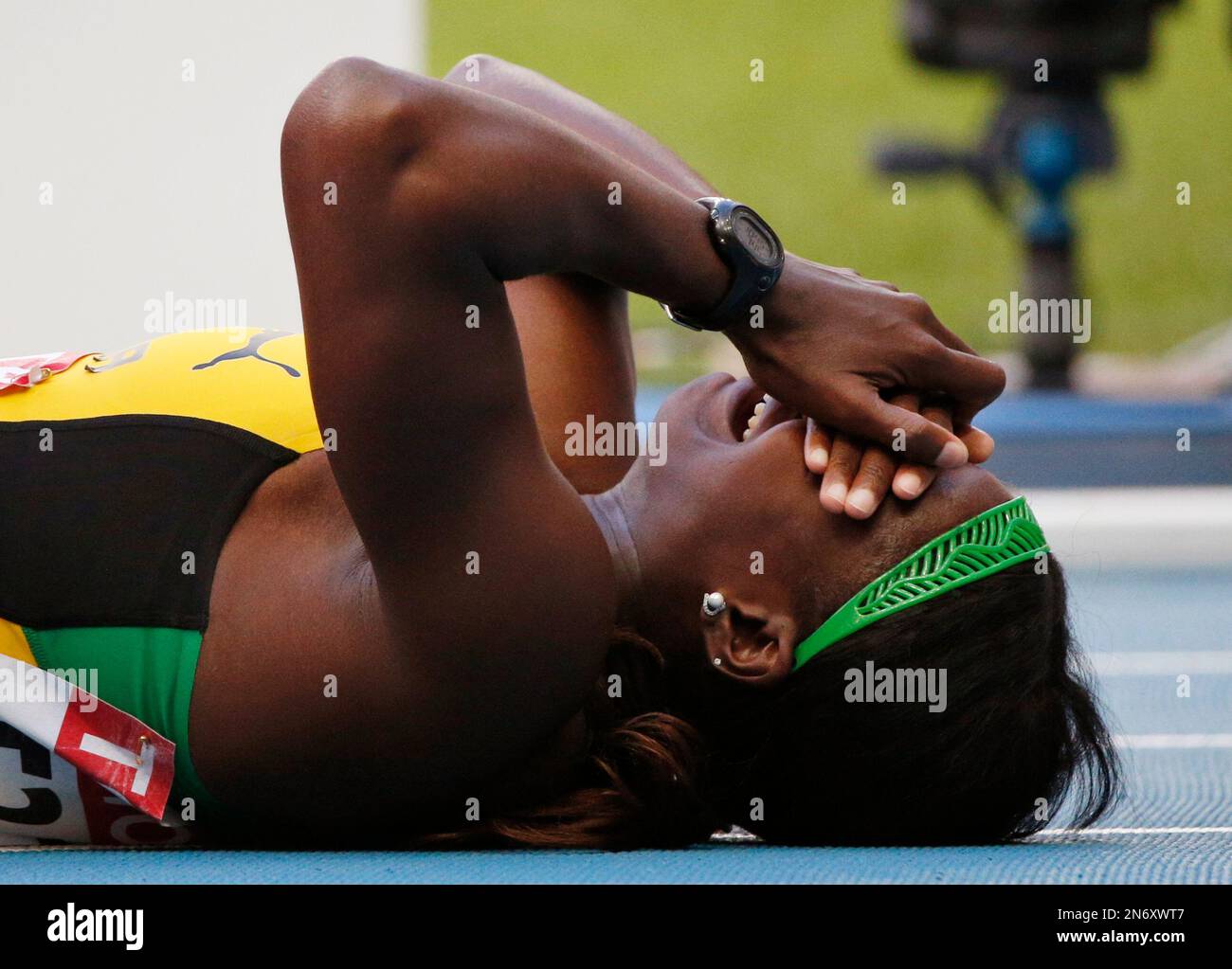 Jamaica's Anneisha McLaughlin lies on the track after a women's 200 ...