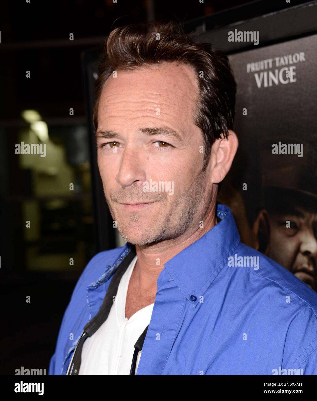 Actor Luke Perry arrives on the red carpet at the premiere of the ...