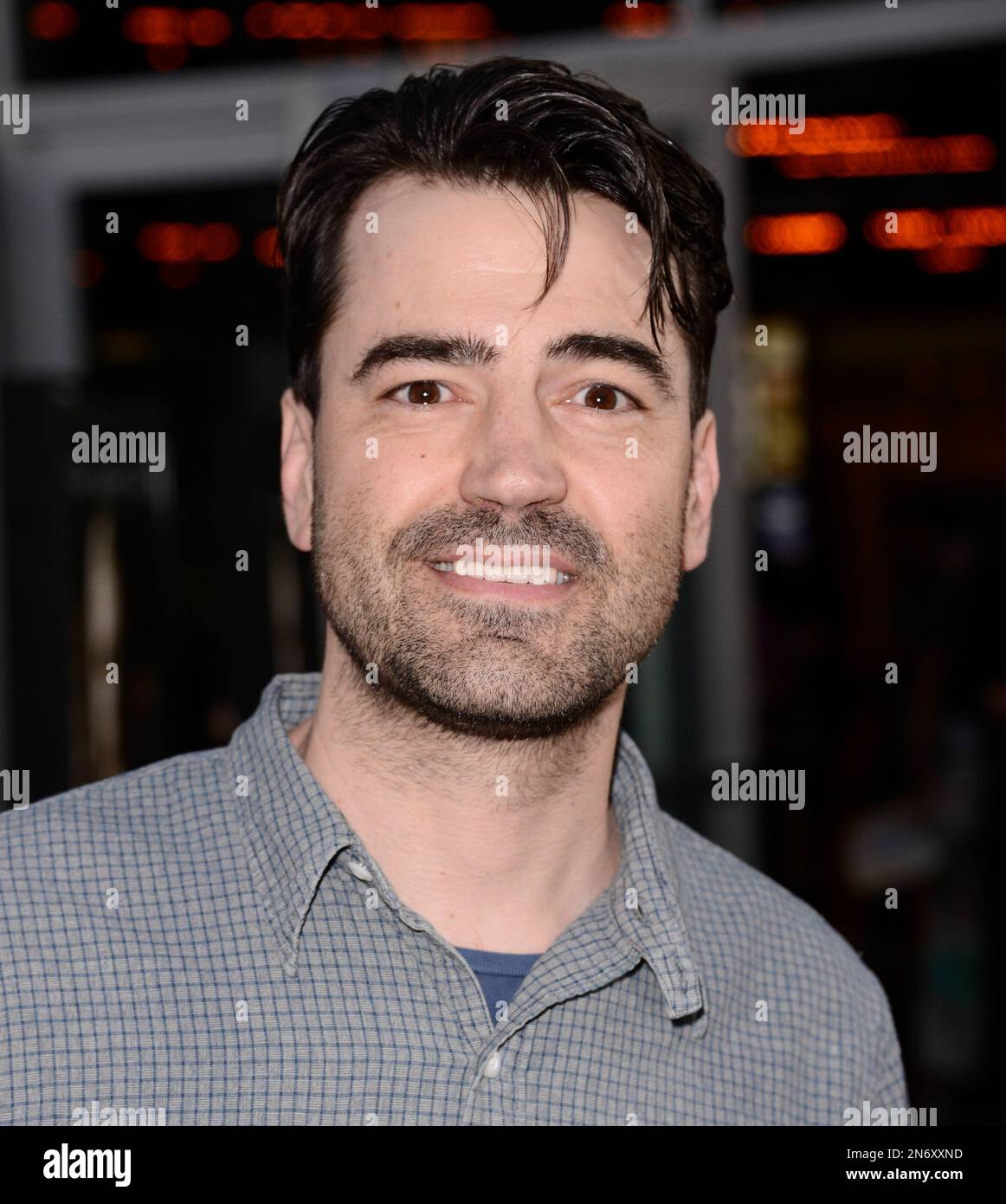 Actor Ron Livingston arrives on the red carpet at the premiere of the ...