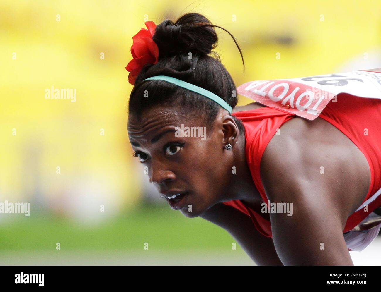 United States' Alysia Johnson Montano rests after competing in a women ...