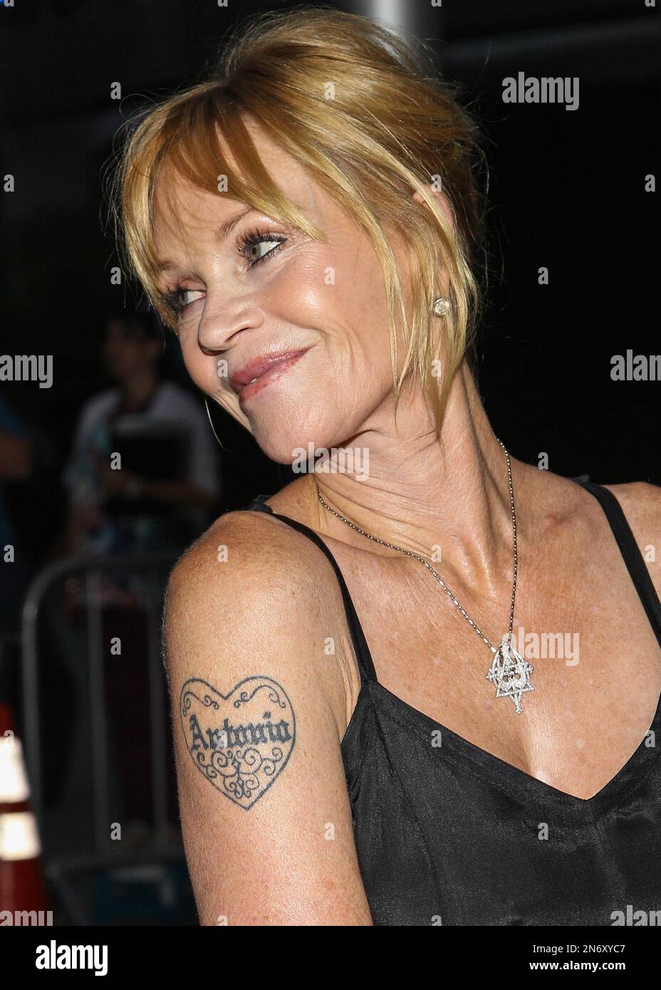 Actress Melanie Griffith arrives at the premiere of "Dark Tourist" at ...