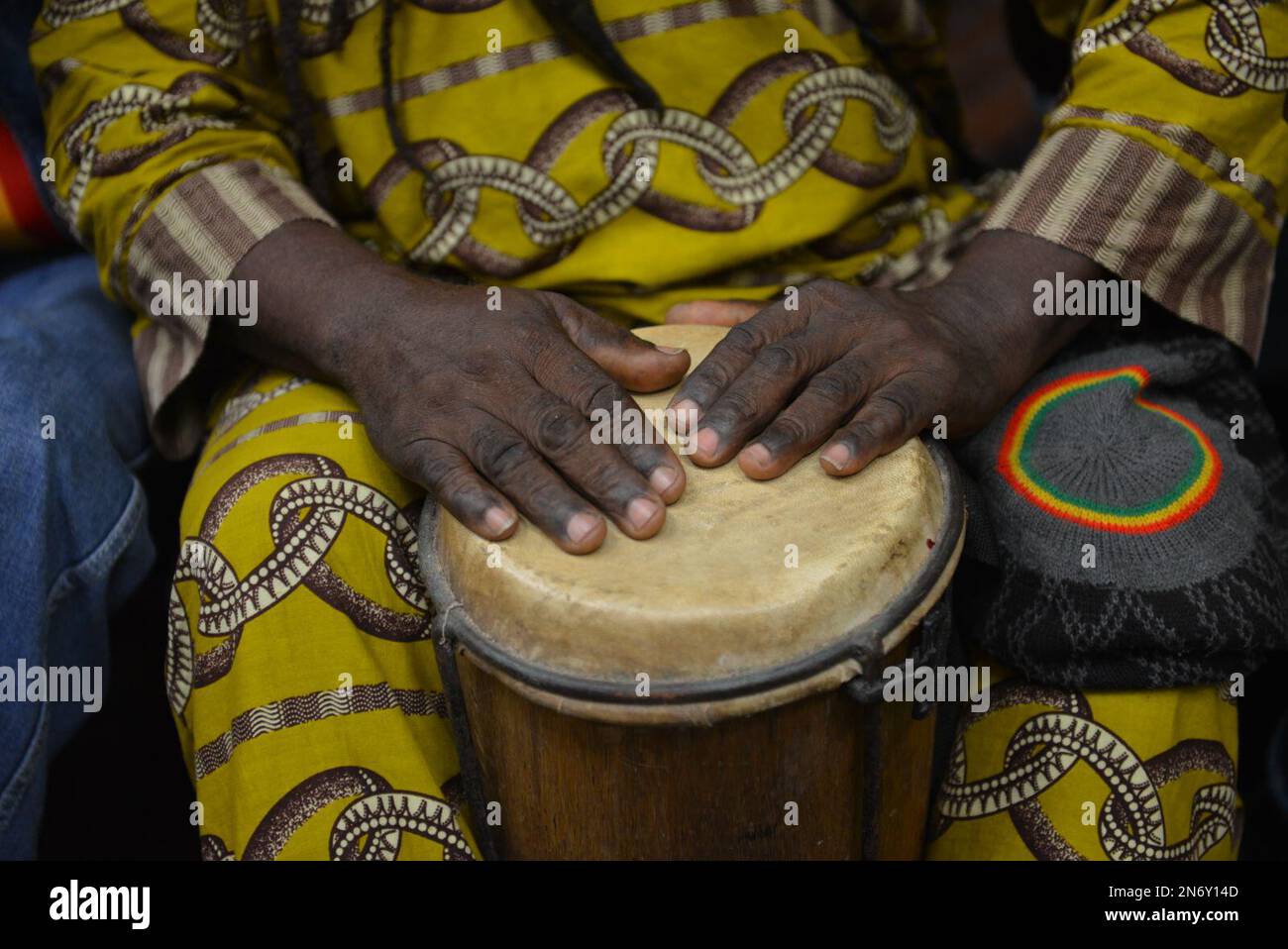 A Rastafarian plays his drum as others chant and sing during a weeklong ...