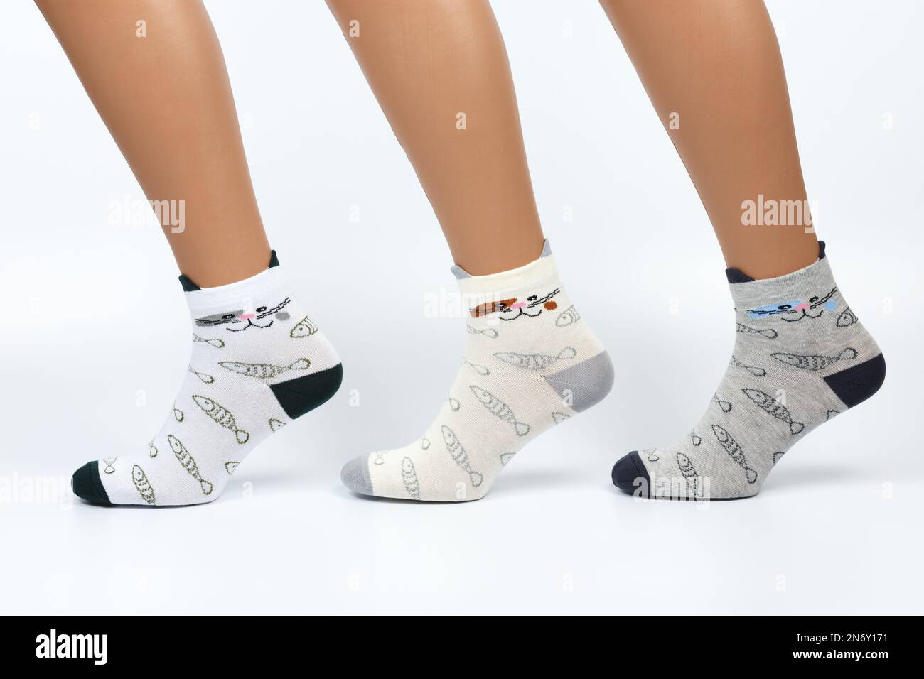 Socks on a white background. Socks on the leg Stock Photo - Alamy