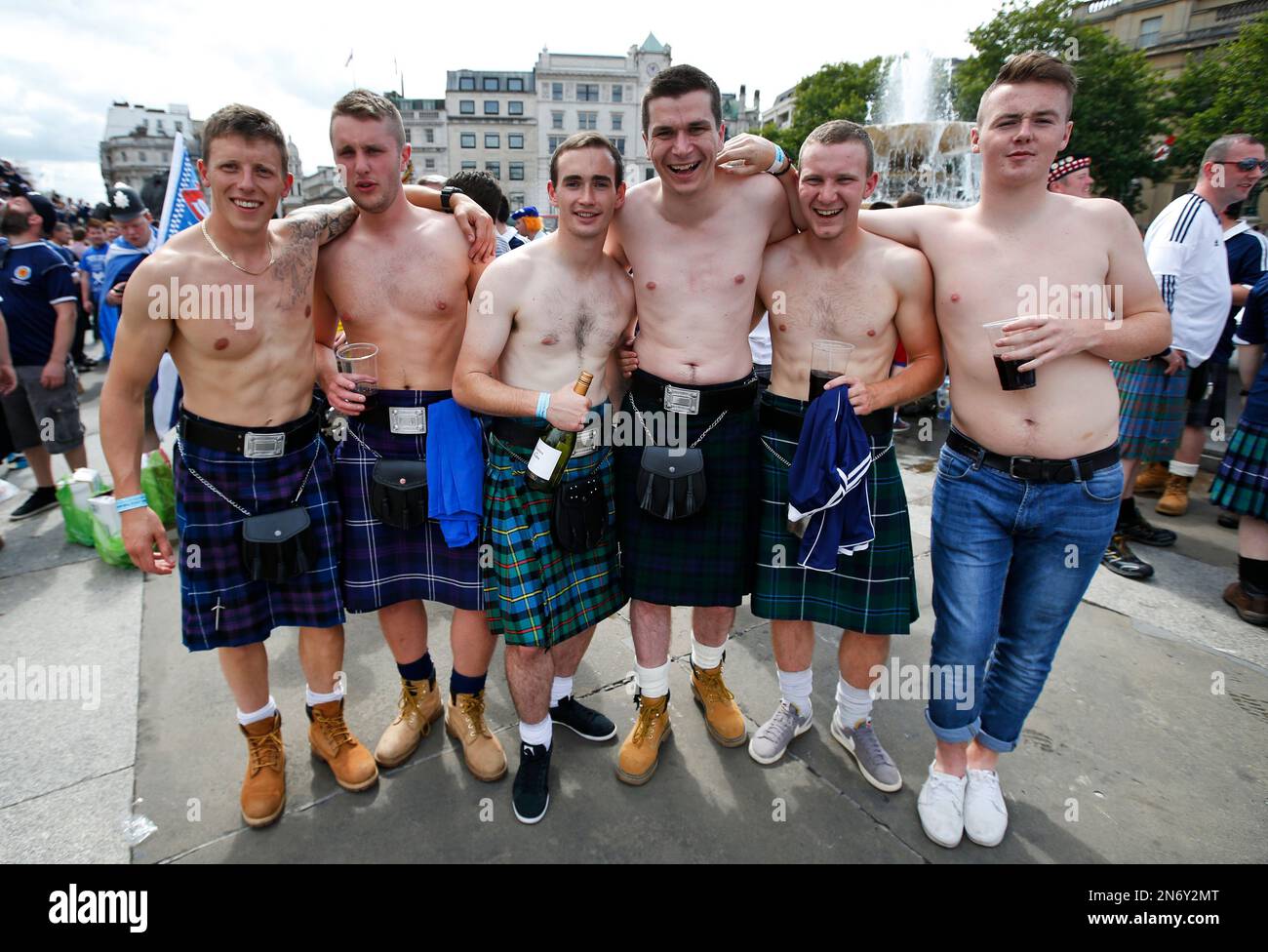 Scotland fans pose for pictures in central London's Trafalgar Square ...