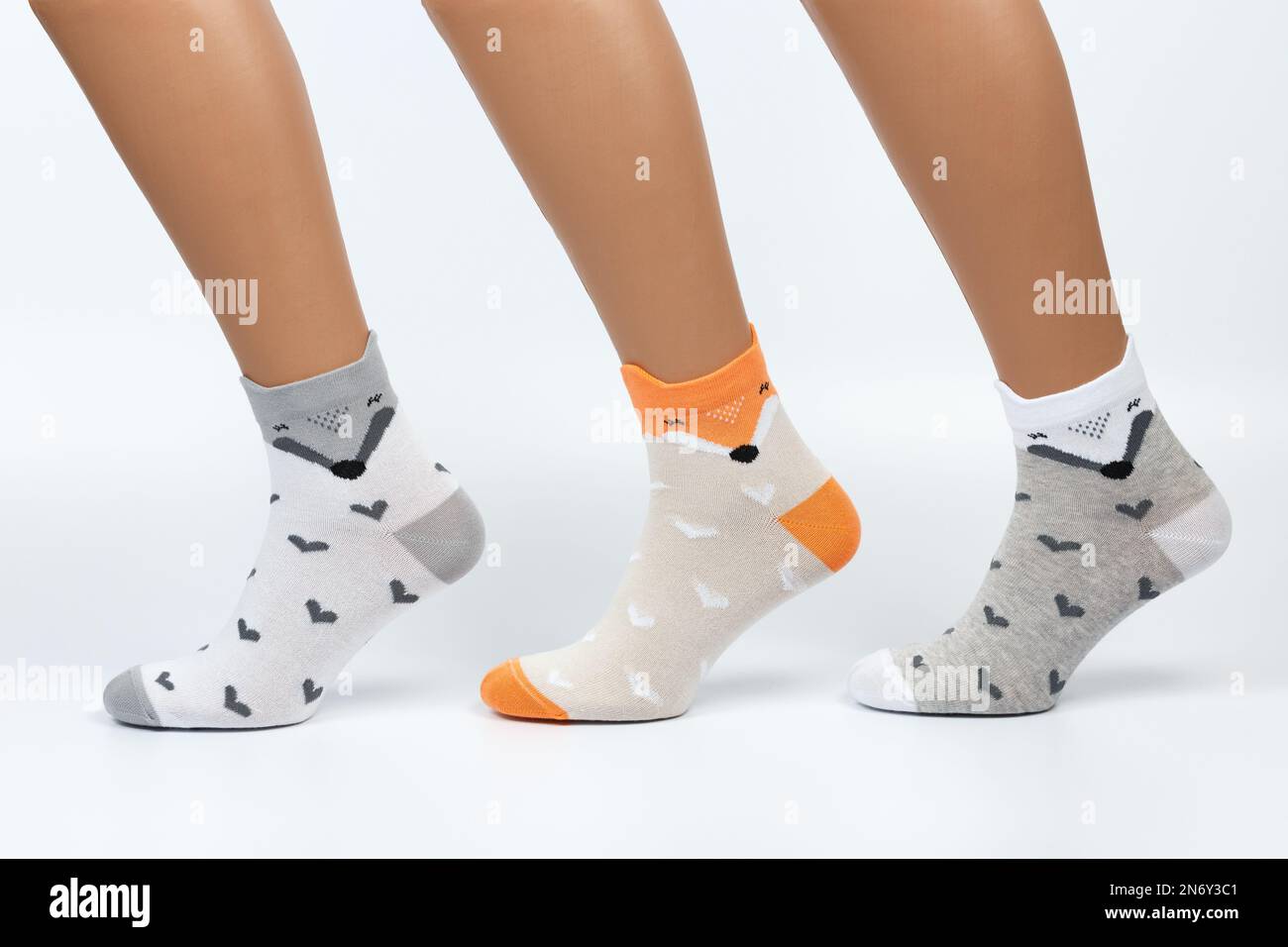 Socks on a white background. Socks on the leg Stock Photo - Alamy