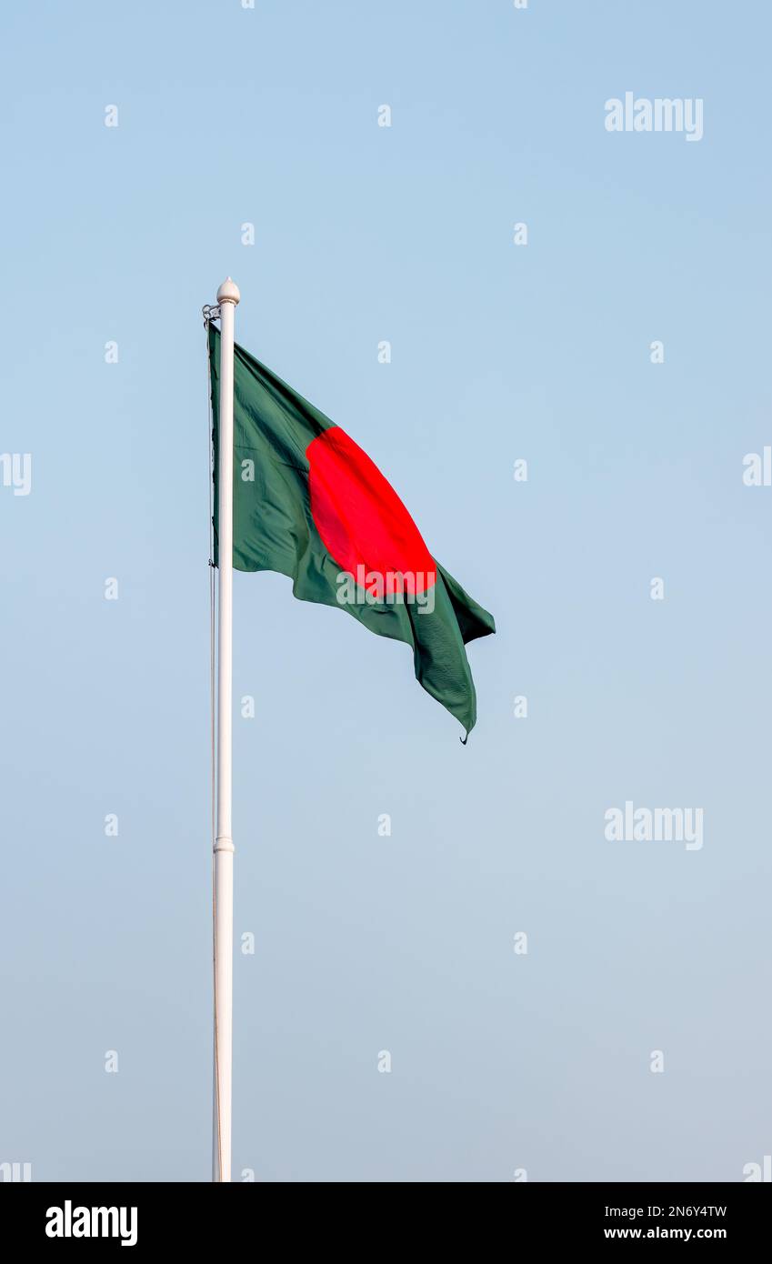 Isolated bangladeshi national flag flying under the blue sky Stock ...