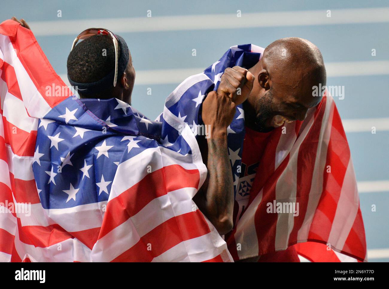 United States' LaShawn Merritt, right, celebrates winning gold with ...