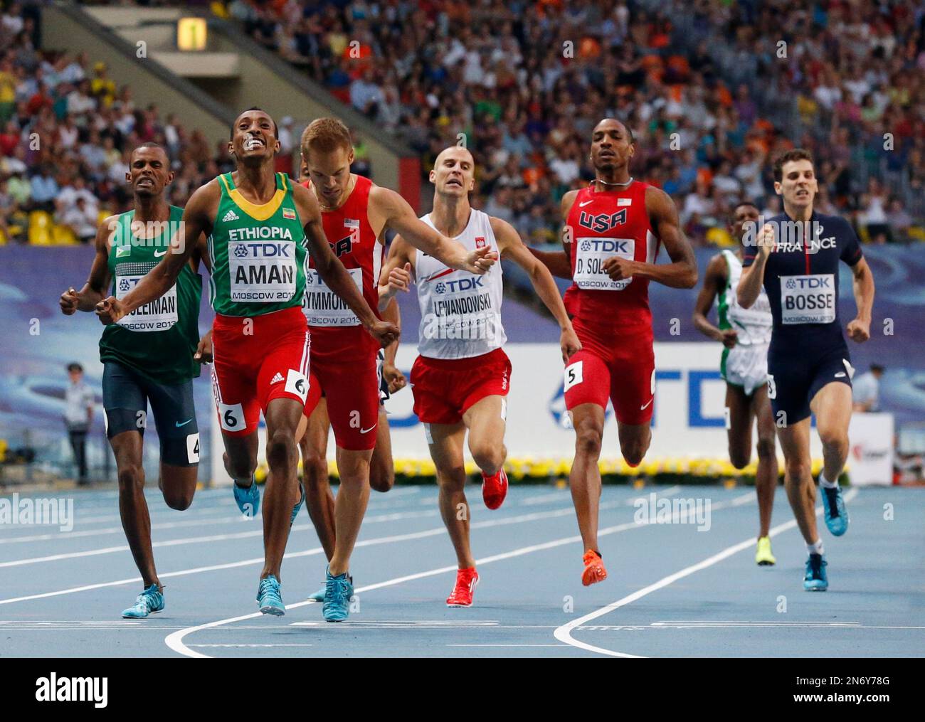 Ethiopia's Mohammed Aman, front, crosses the finish line ahead of ...
