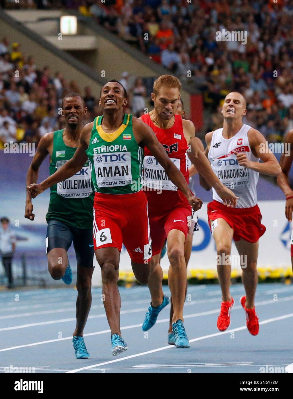 Ethiopia's Mohammed Aman, front, crosses the finish line ahead of ...