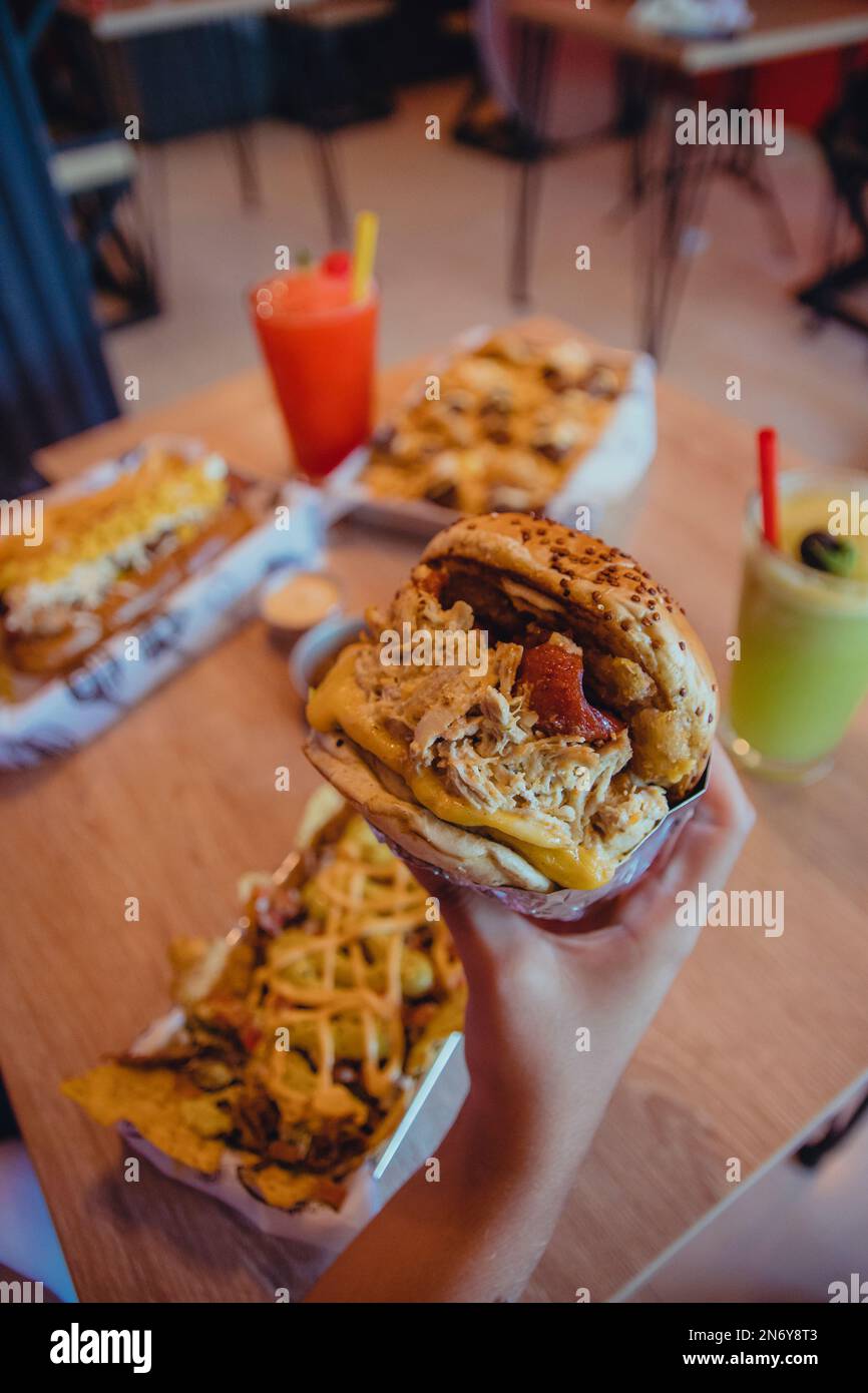 delicious fast food to share with family and friends Stock Photo - Alamy