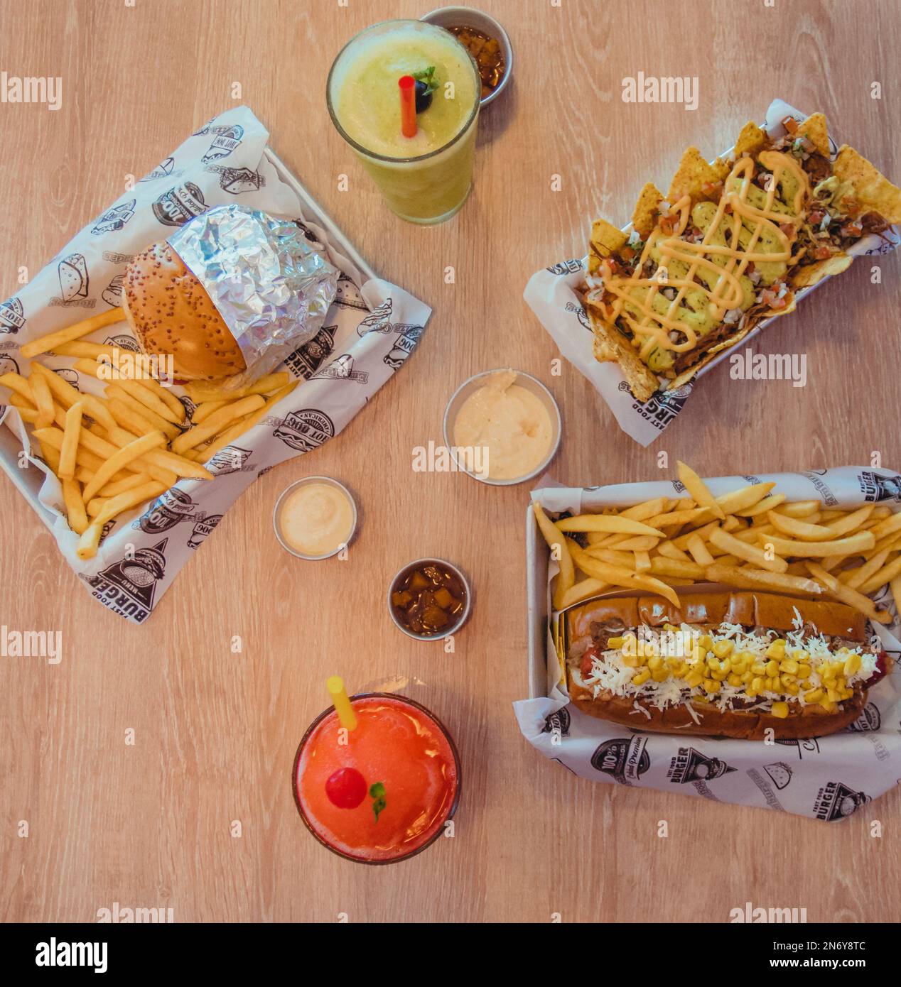 delicious fast food to share with family and friends Stock Photo - Alamy