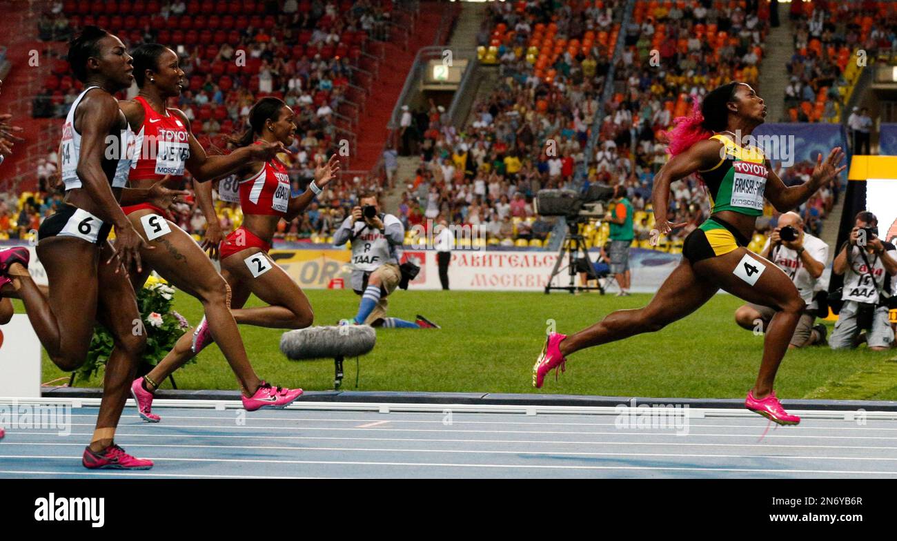 Jamaica's Shelly-Ann Fraser-Pryce, right, powers ahead to the finish ...