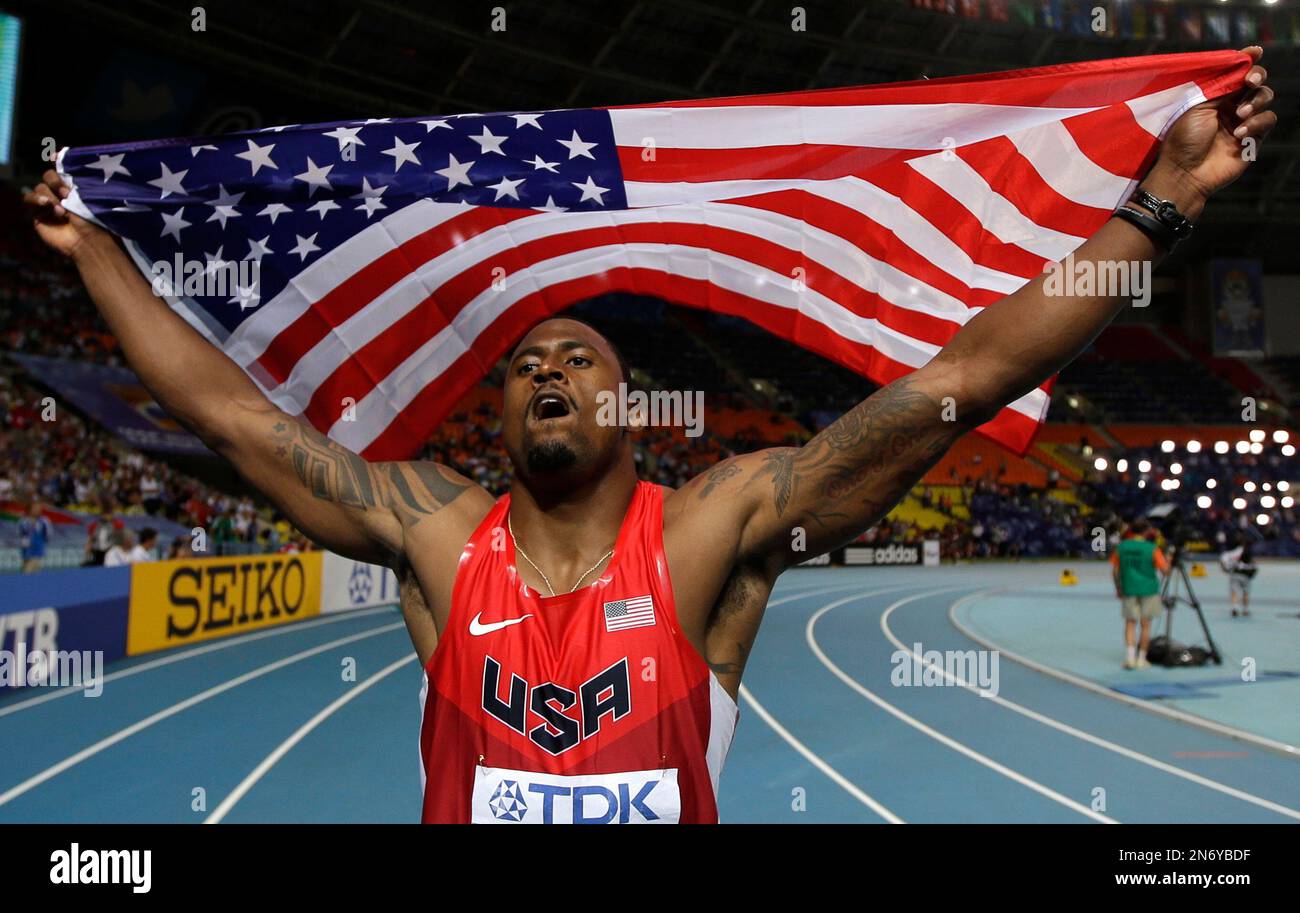 United States' David Oliver celebrates his gold medal in the men's 110 ...