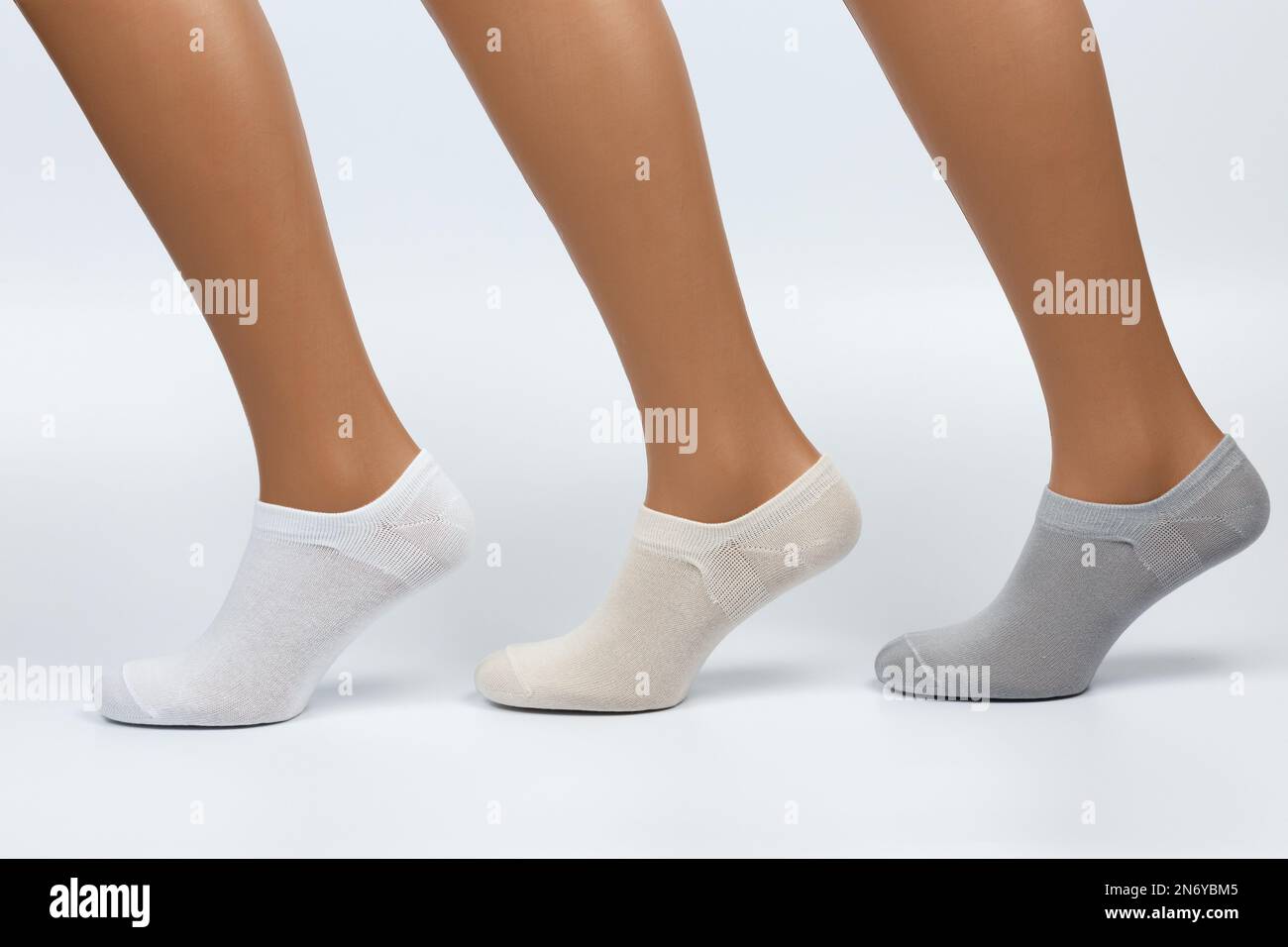 Socks on a white background. Socks on the leg Stock Photo - Alamy