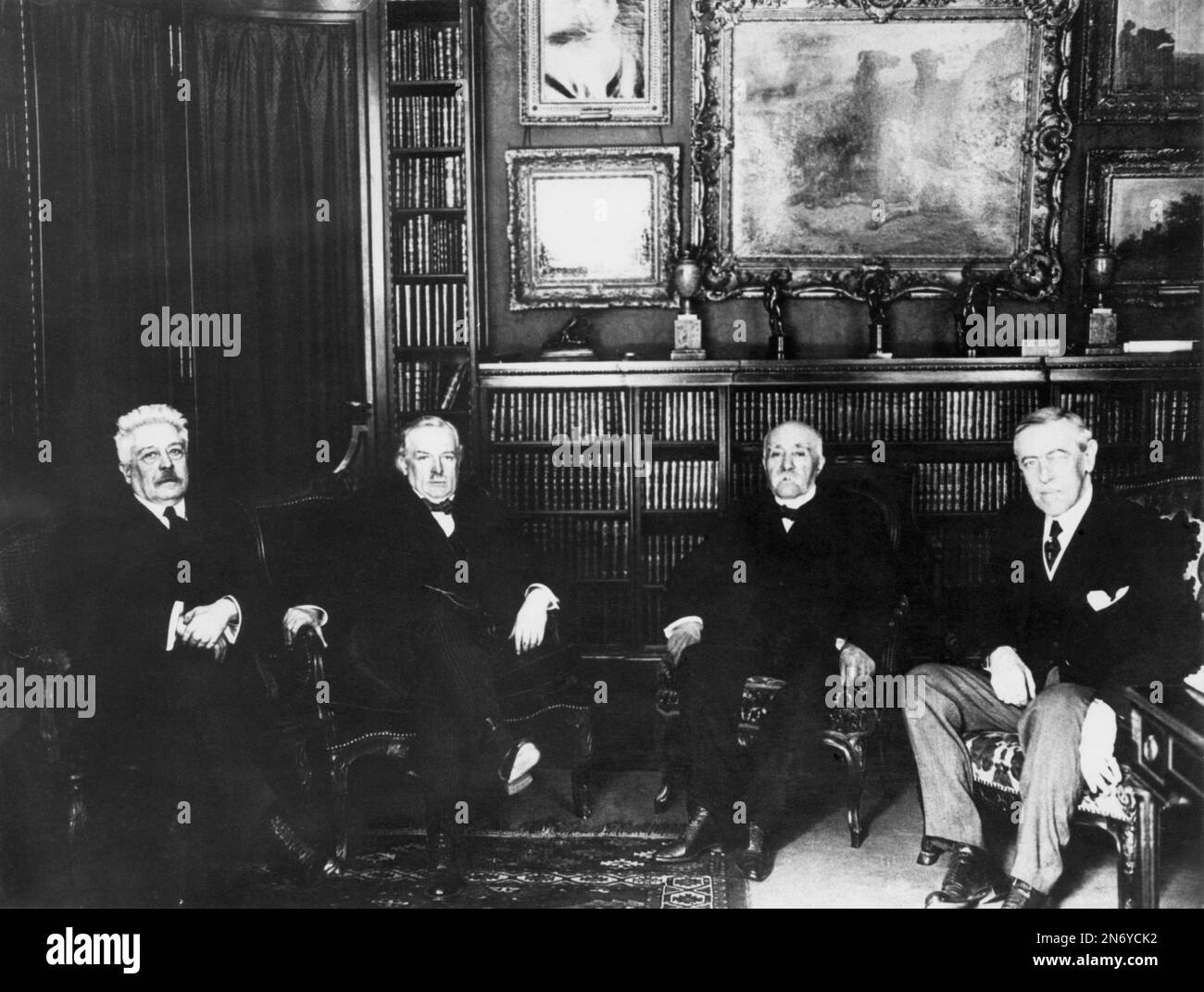 US President Woodrow Wilson, right, attends the Paris Peace Conference ...