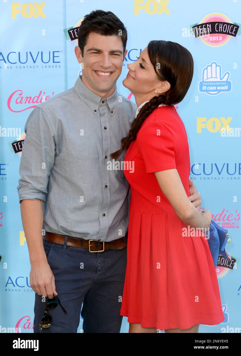 Max Greenfield, left, and Tess Sanchez arrive at the Teen Choice Awards ...