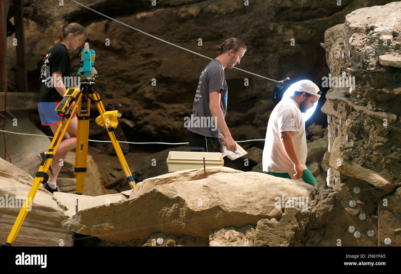 In this photo made on Monday, Aug. 5, 2013, archeology students, left ...