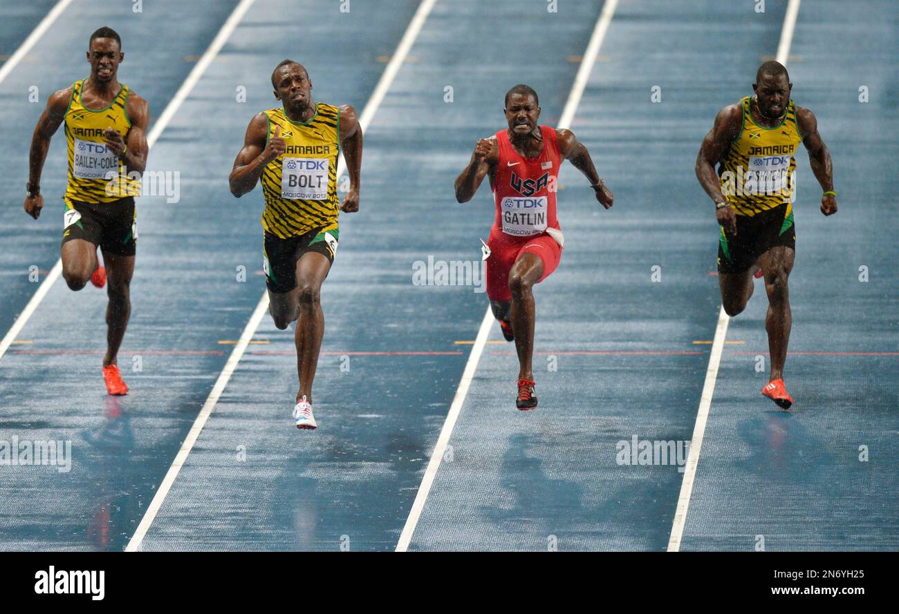 From left, Jamaica's Kemar Bailey-Cole, Jamaica's Usain Bolt, USA's Justin Gatlin and Jamaica's ...