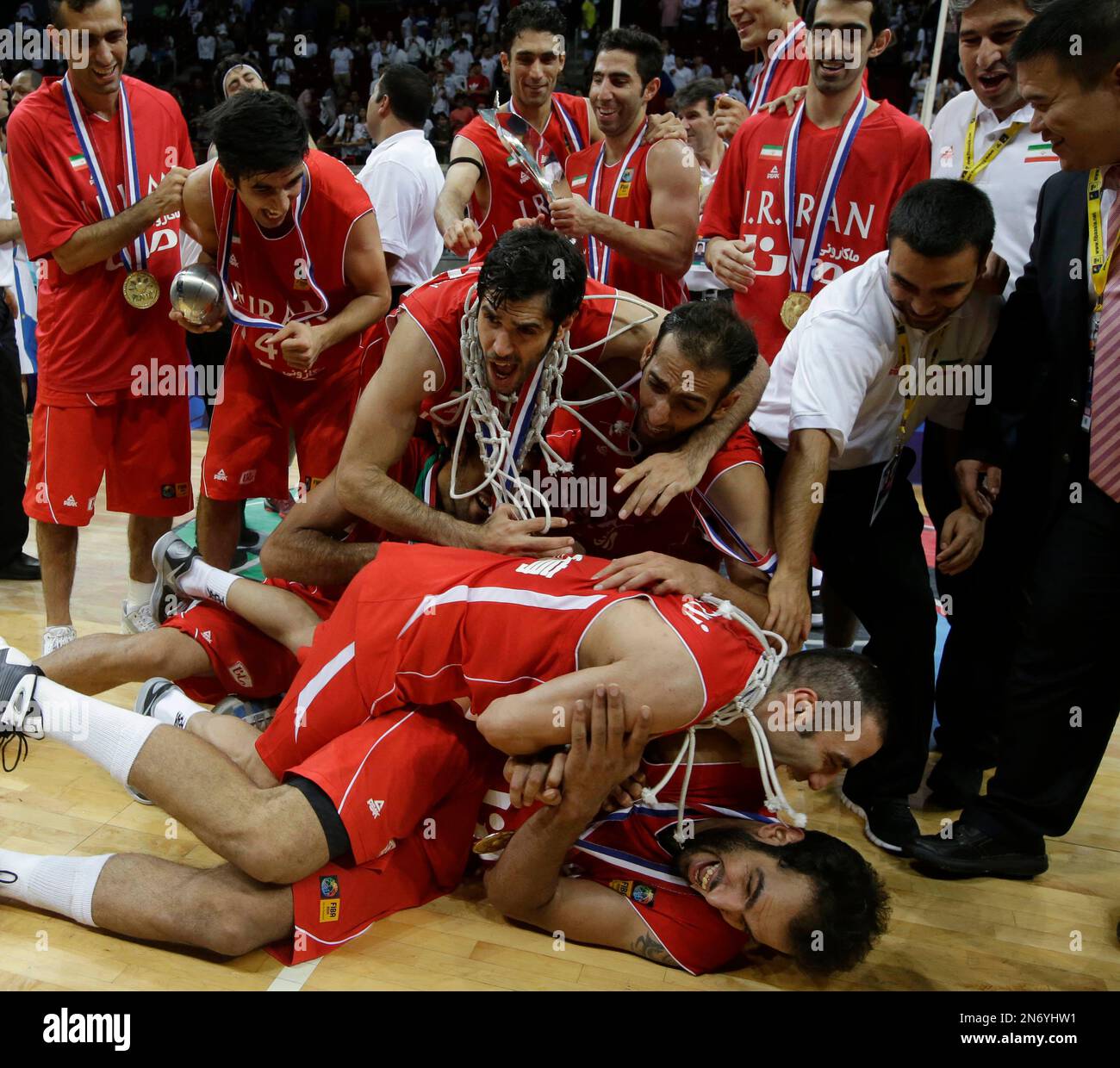 Iranian players celebrate following their 85-71 win over the ...